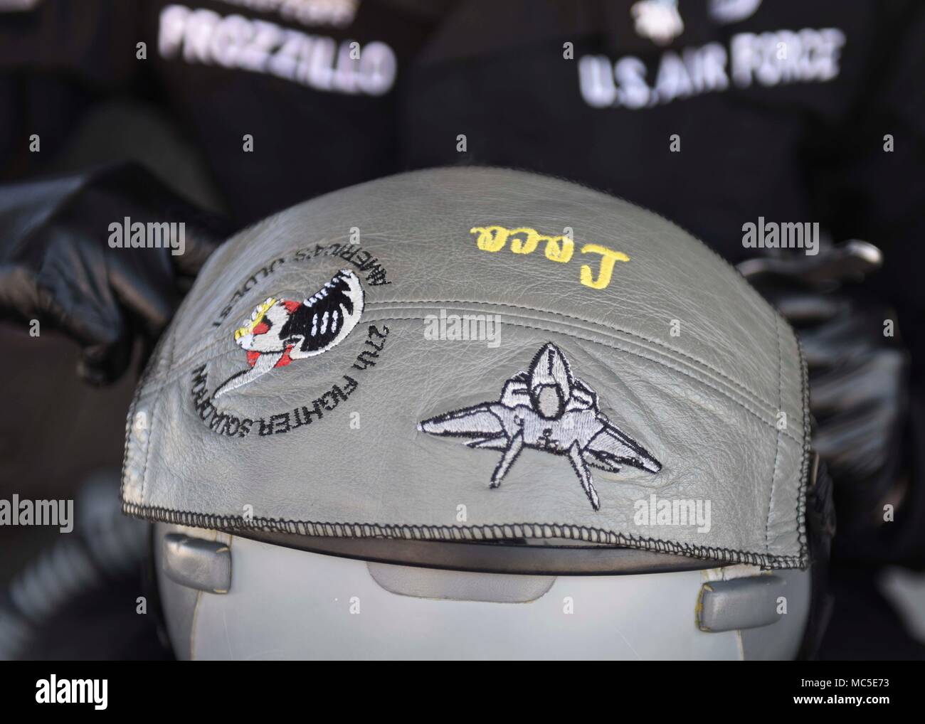 An Air Combat Command F-22 Raptor Demonstration Team member cleans U.S ...