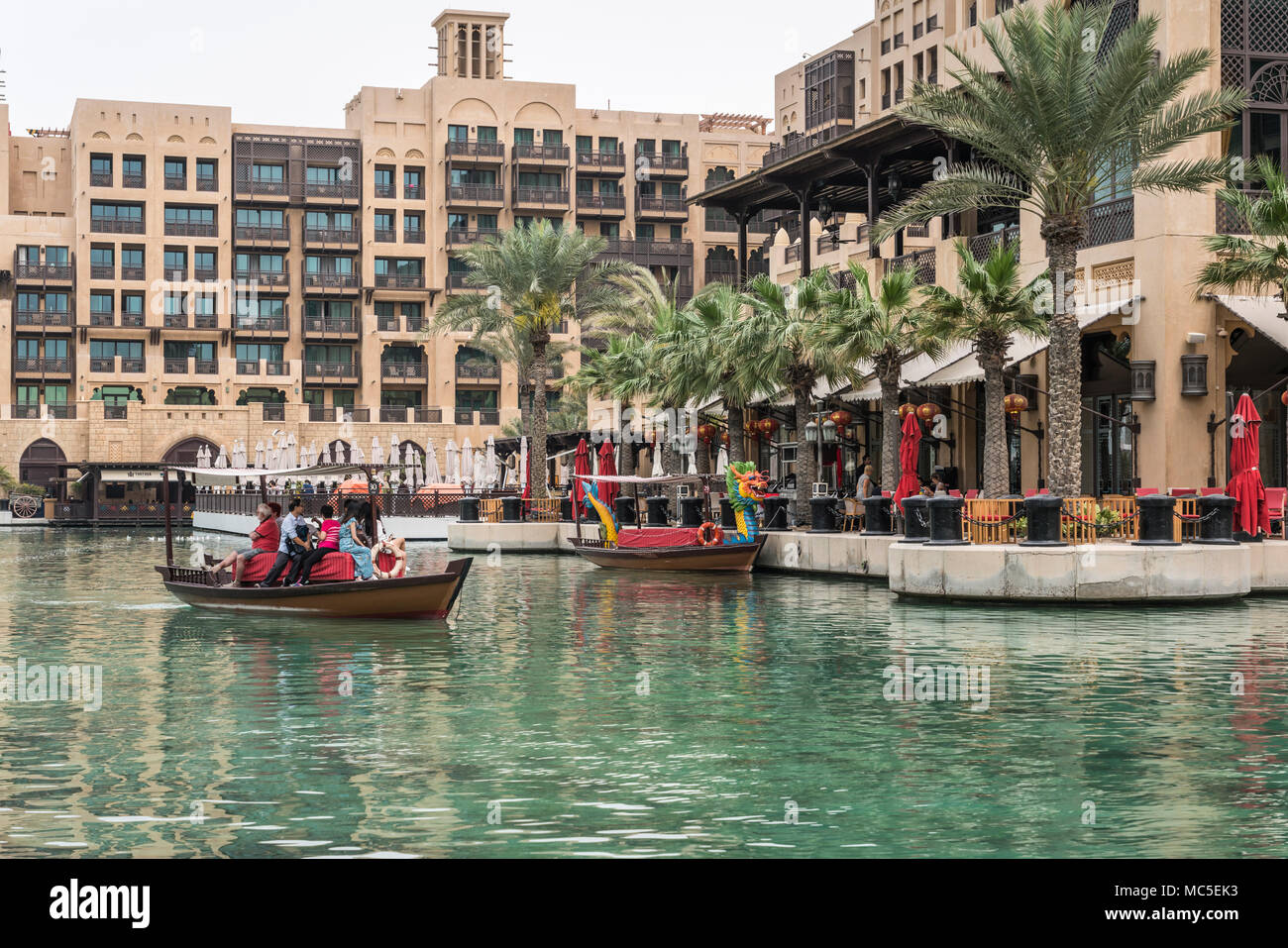 Abra boats in the canals of the Madinat Jumeirah Souq in Dubai, UAE ...