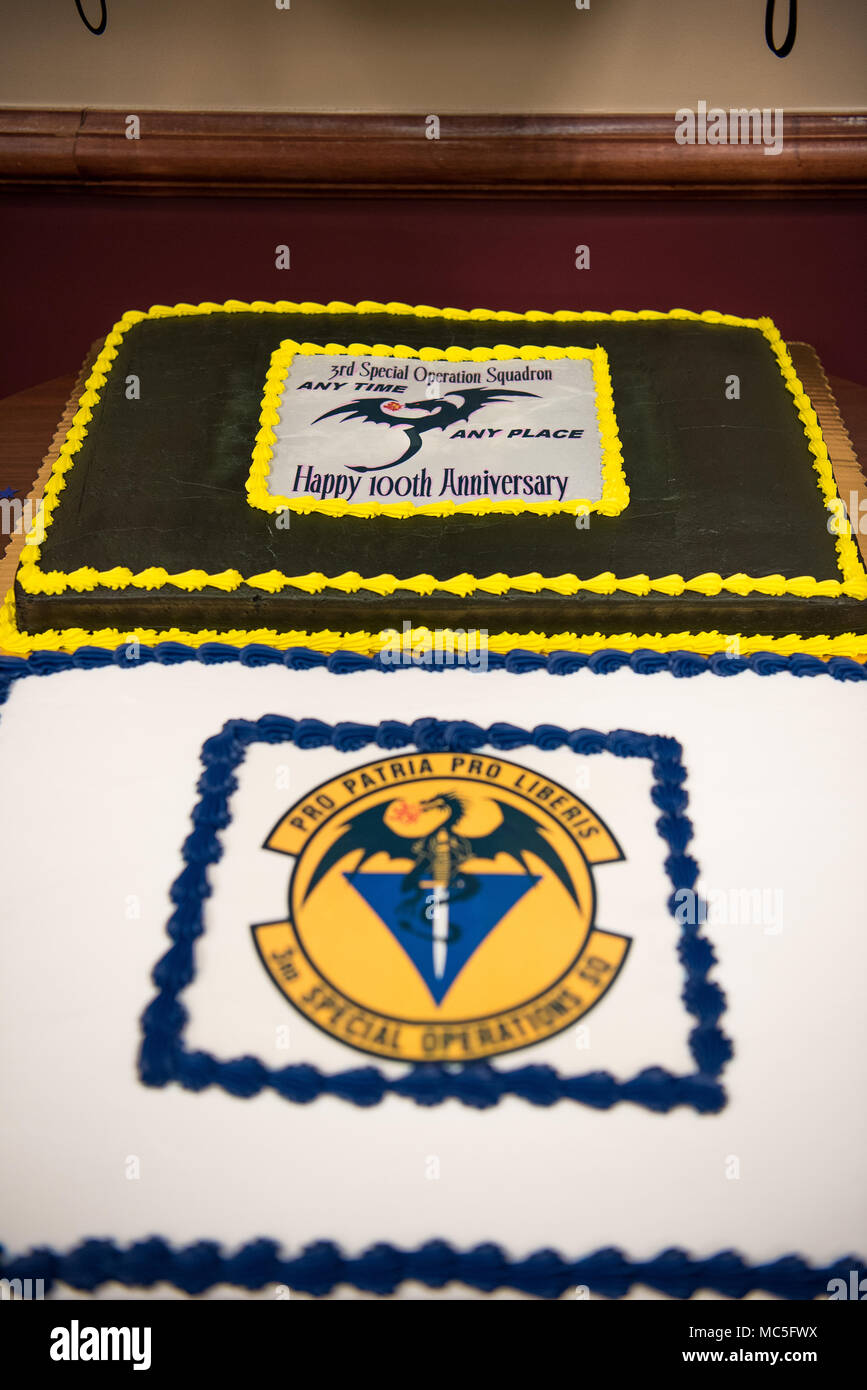 Two cakes sit on a table at the 100th anniversary of the 3rd SOS at ...