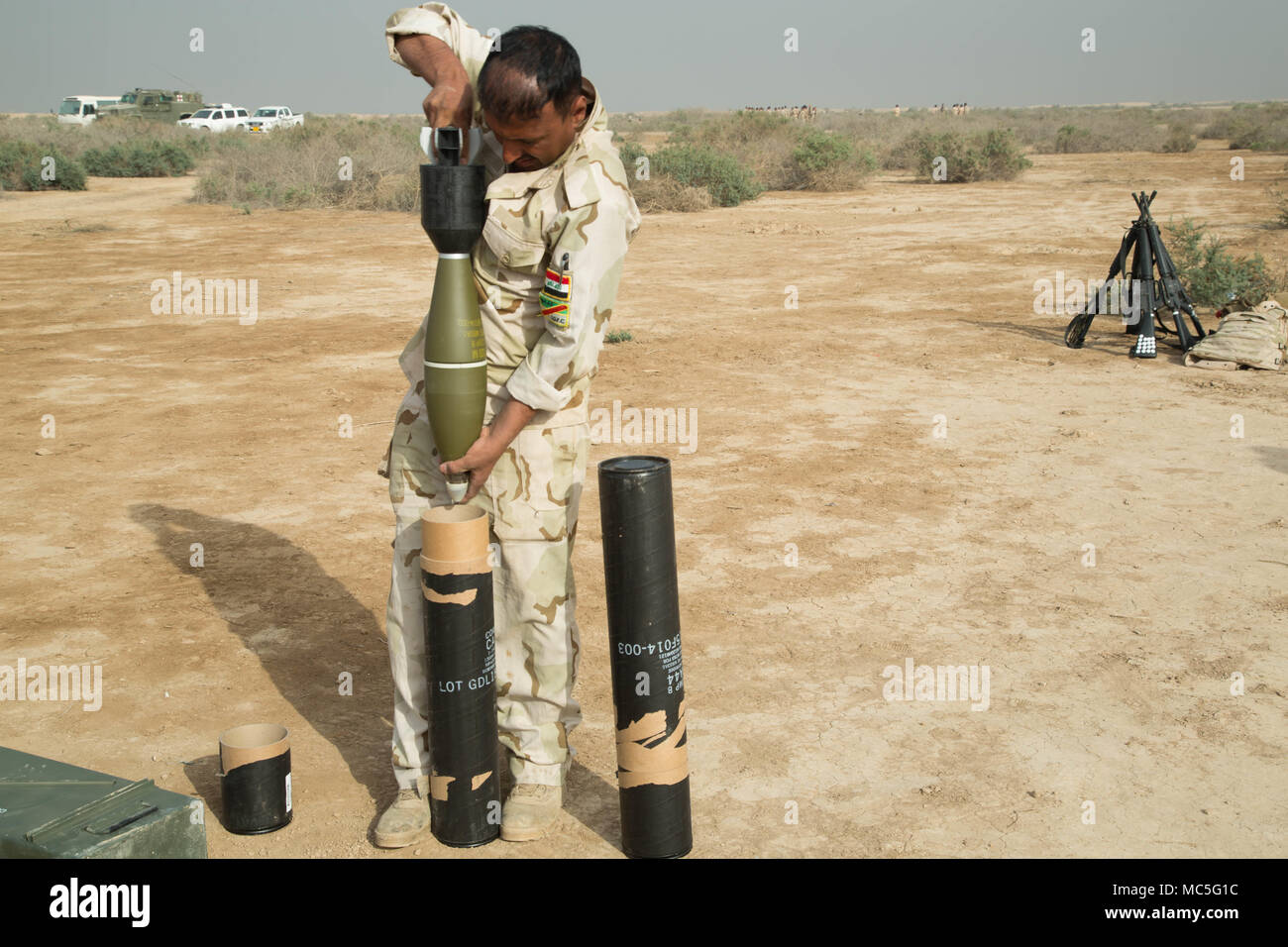 Iraqi soldiers from the 40th Brigade, set up a 120 mm mortar system at ...