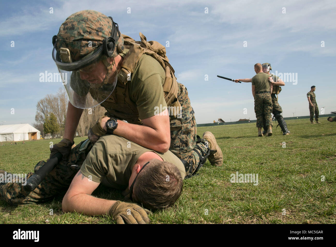 Marines with Black Sea Rotational Force 18.1 restrain a Marine role ...