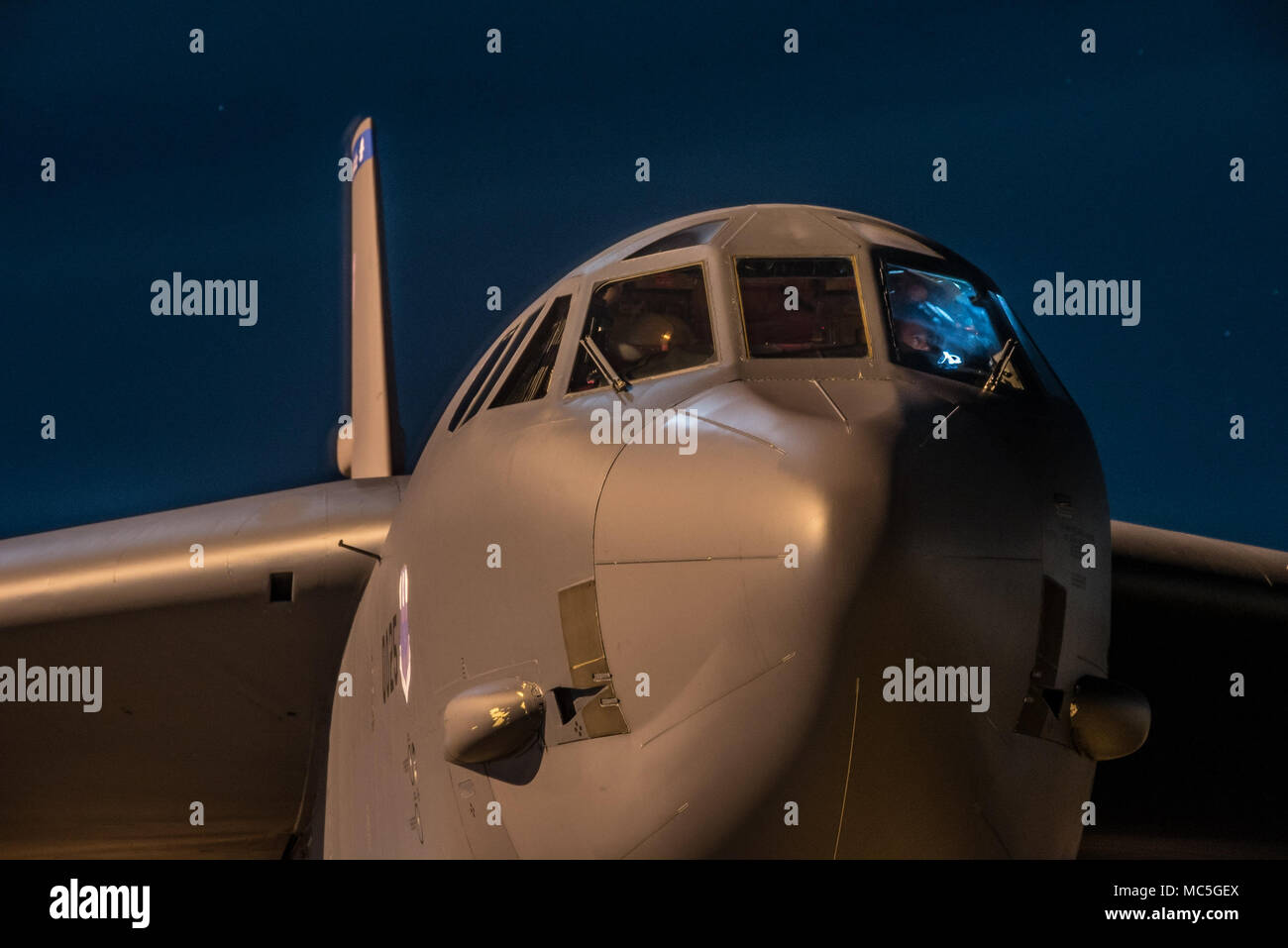 A U.S. Air Force B-52H Stratofortress preflight crew works in the ...