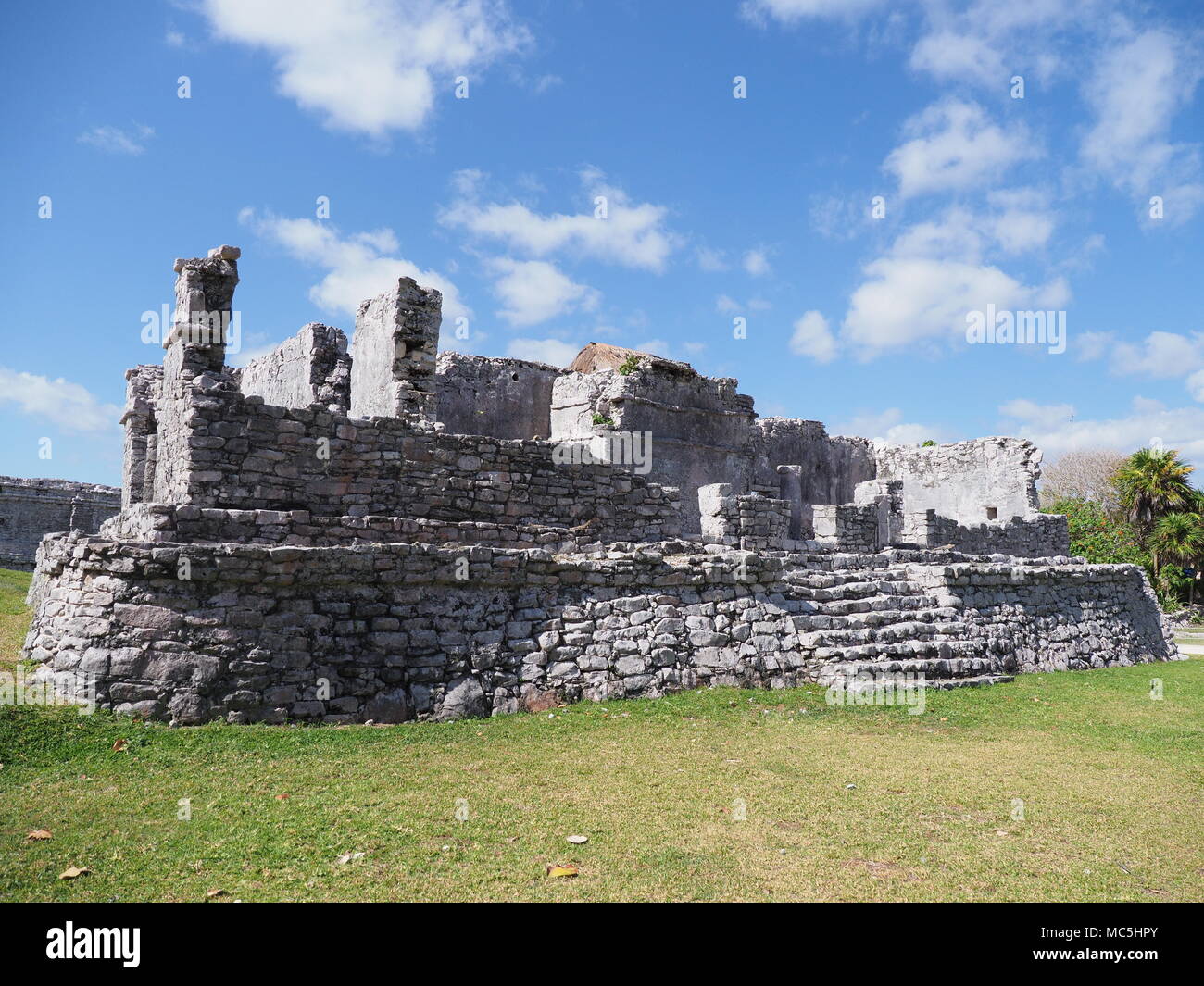 Ancient ruins of stony historical building with stairs at TULUM mayan ...