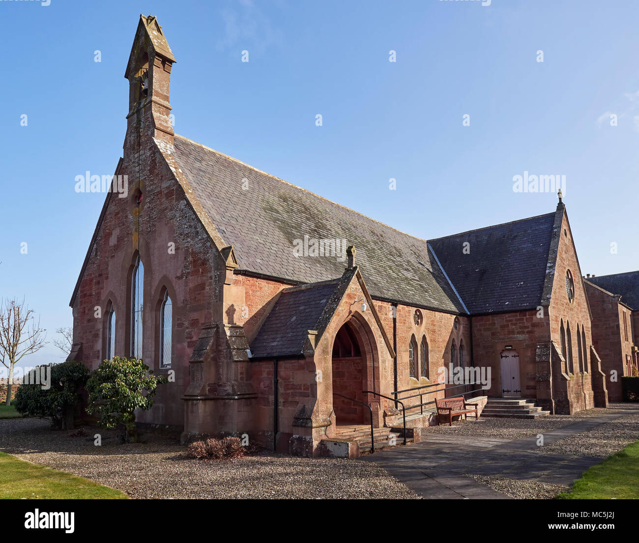 Colliston Parish Church, built in 1870 by the Victorians stands next to ...