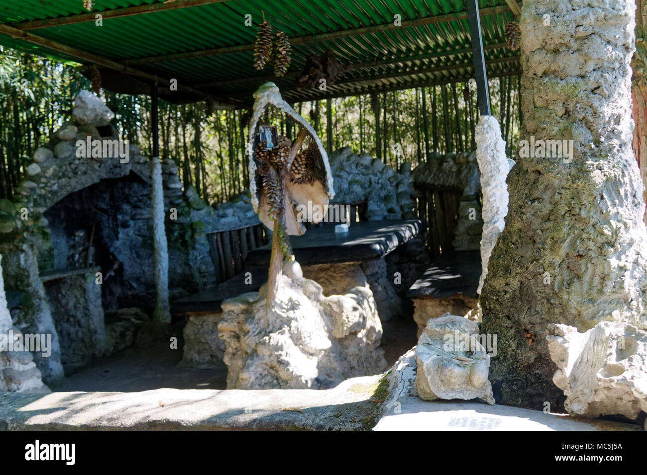 Garden alcove in the forest, relaxing and resting place Stock Photo - Alamy