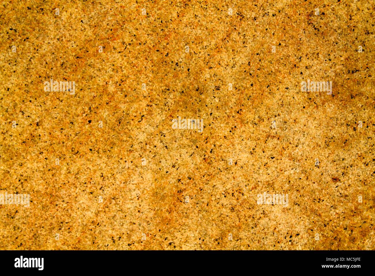 Orange Elegant stone wall from small square parts. Rock texture surface ...