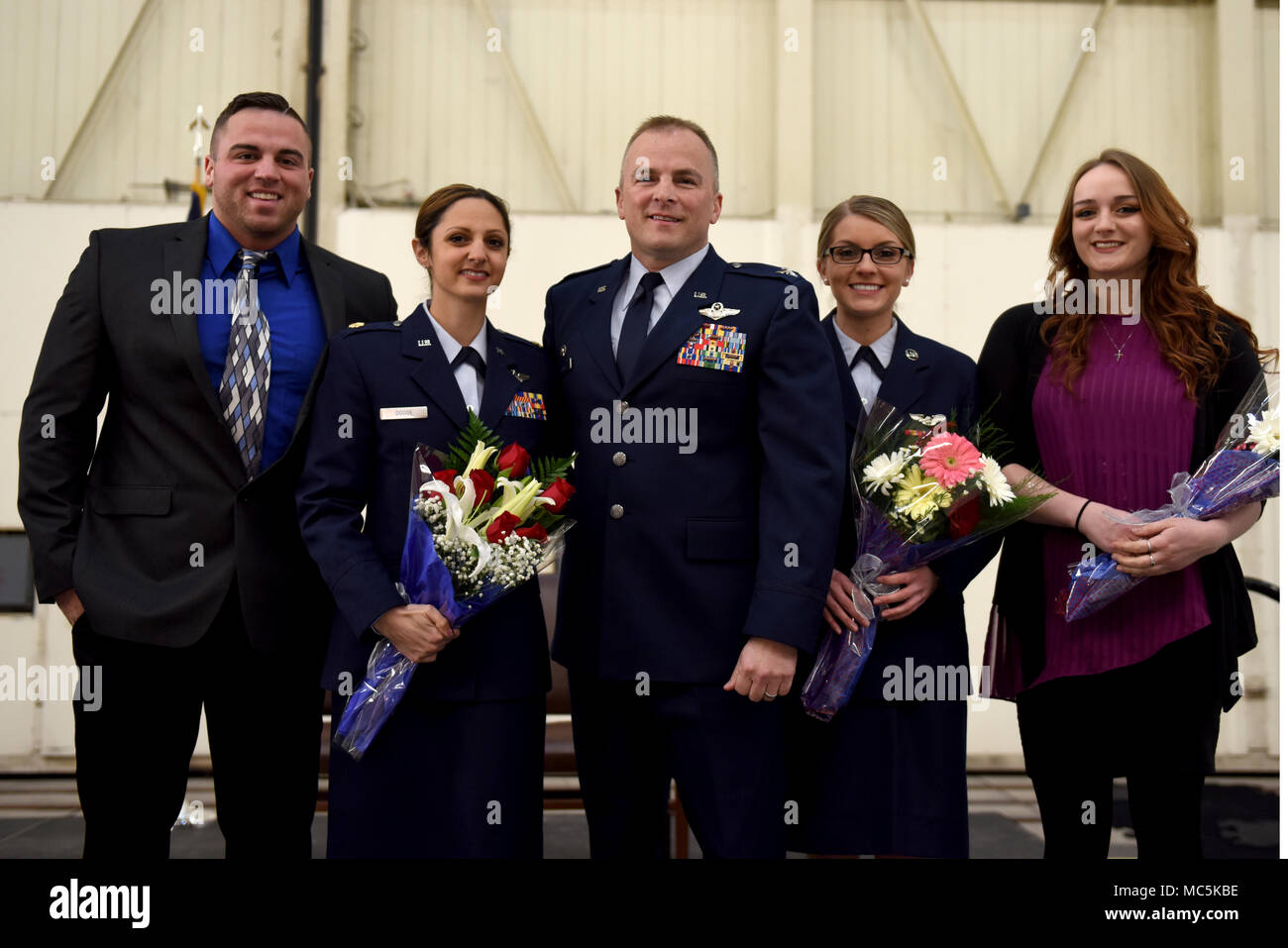 U.S. Air Force Lt. Col. Gary Dodge poses with his family after they pin ...