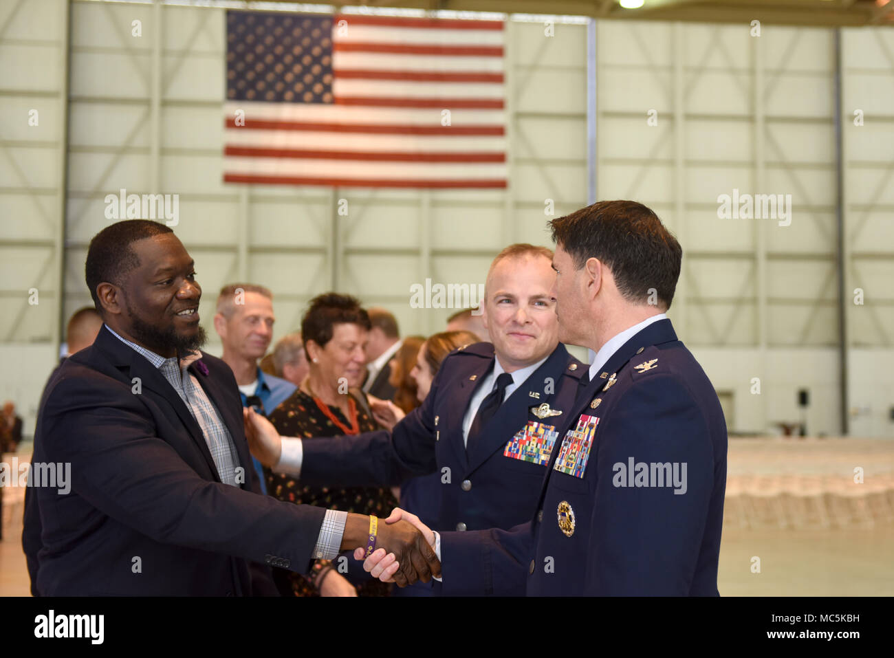 U.S. Air Force Col. Gary Dodge (middle) introduces guests to Col ...