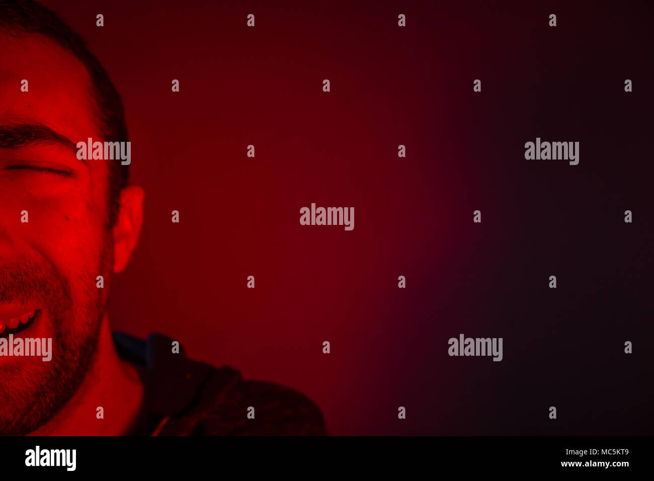 Man is suffering from pain or grief. Close up headshot portrait of man ...