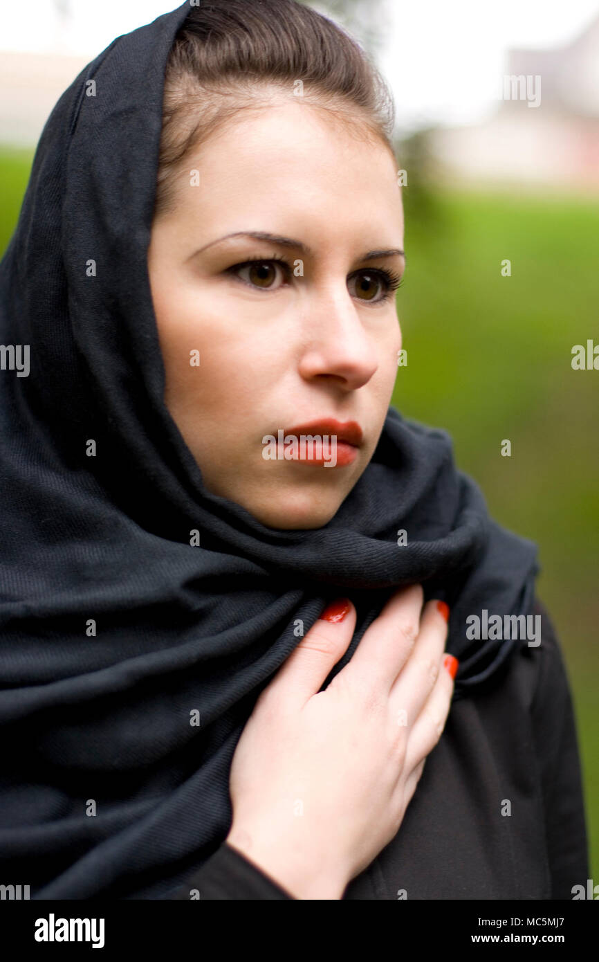 closeup portrait of inconsolable widow Stock Photo - Alamy
