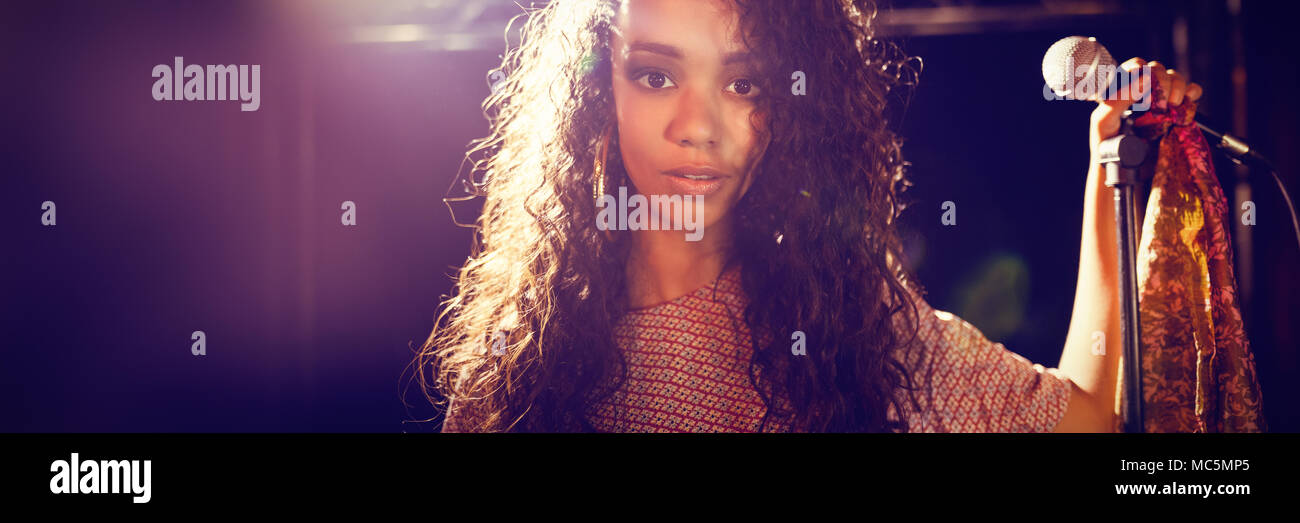 Singer with microphone hi-res stock photography and images - Alamy