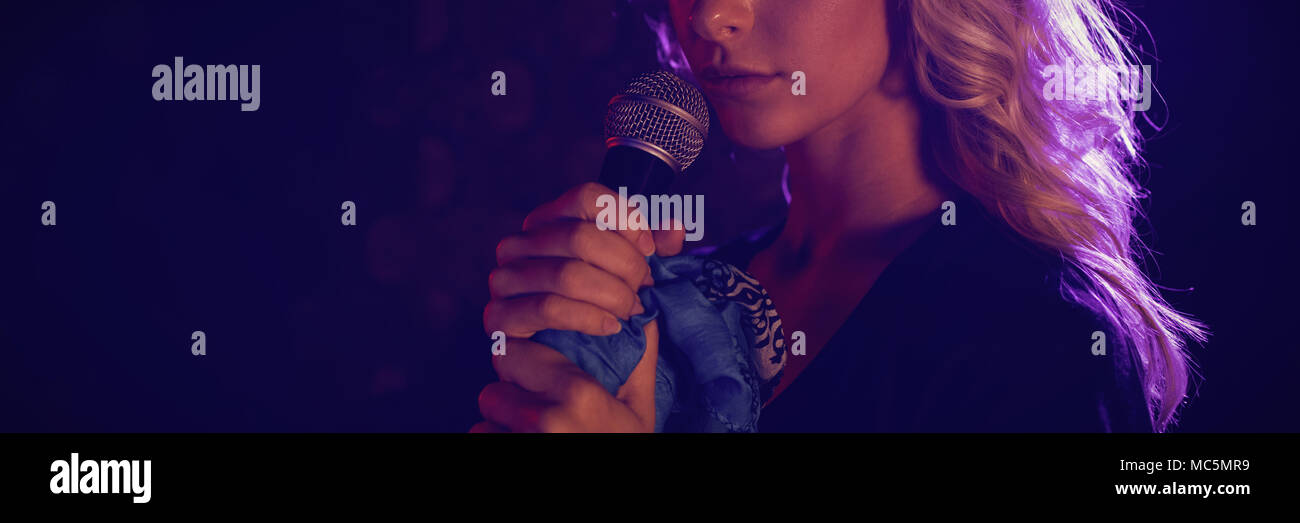 Female singer stage microphone hi-res stock photography and images - Alamy