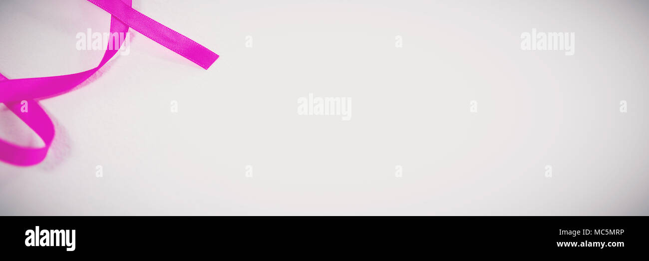 Pink ribbon on white background Stock Photo - Alamy