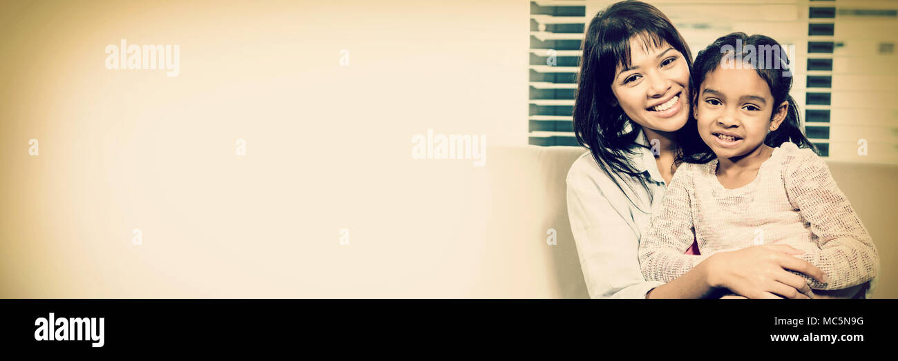 Mother embracing daughter hi-res stock photography and images - Alamy