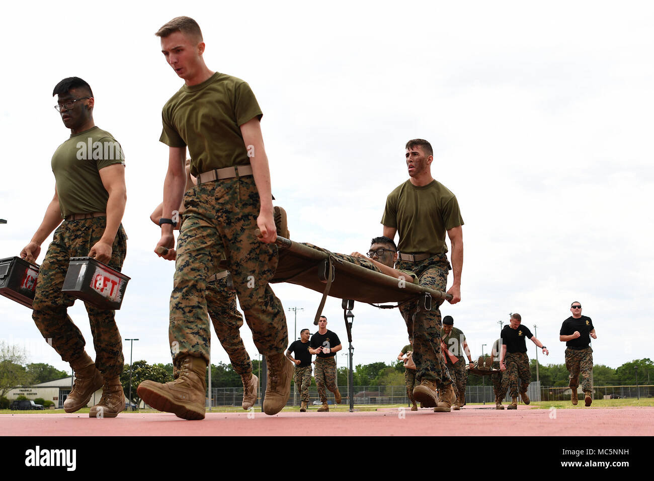 Members of the Keesler Marine Detachment participate in a timed ...