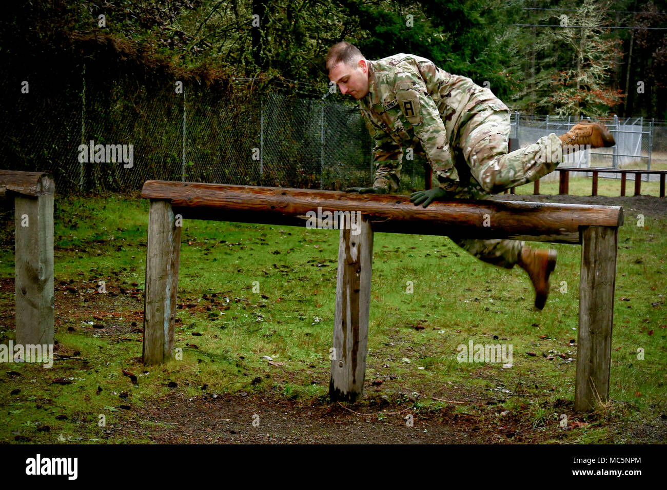 A Soldier assigned to the 189th Combined Arms Training Brigade hurls ...