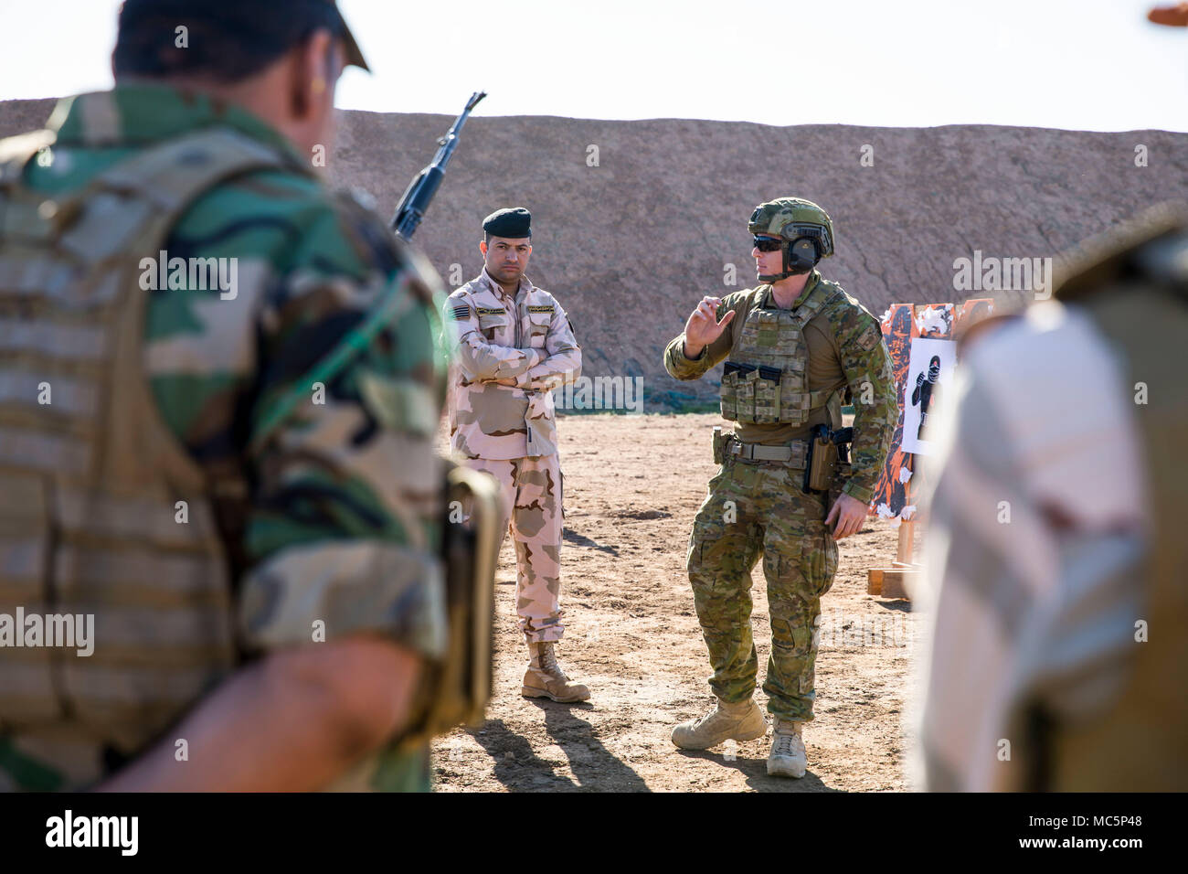 Australian army Cpl. Philip Lewis, with Task Force Taji, conducts a ...