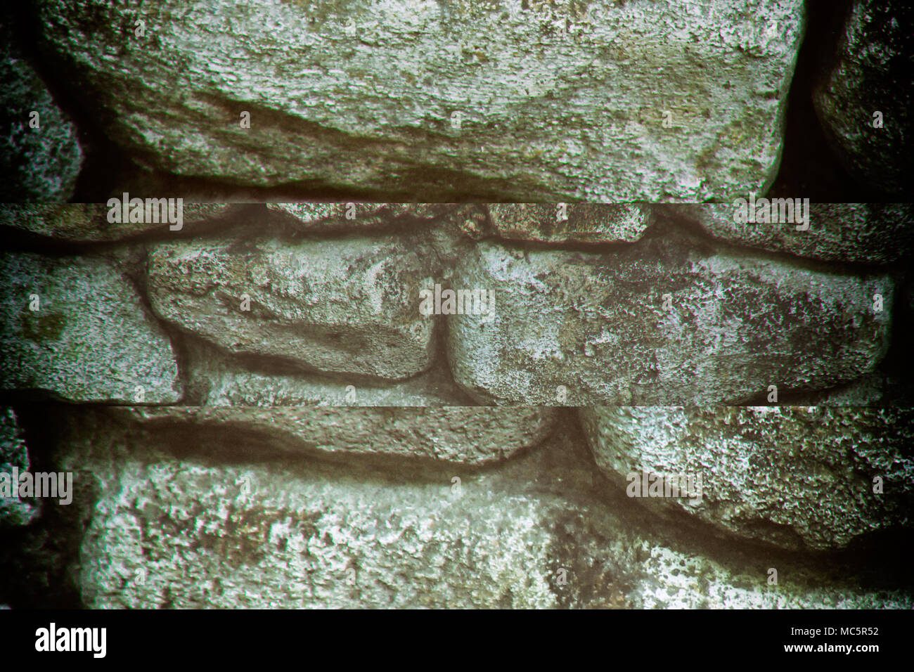 Stone wall for background or rocks rough texture Stock Photo - Alamy
