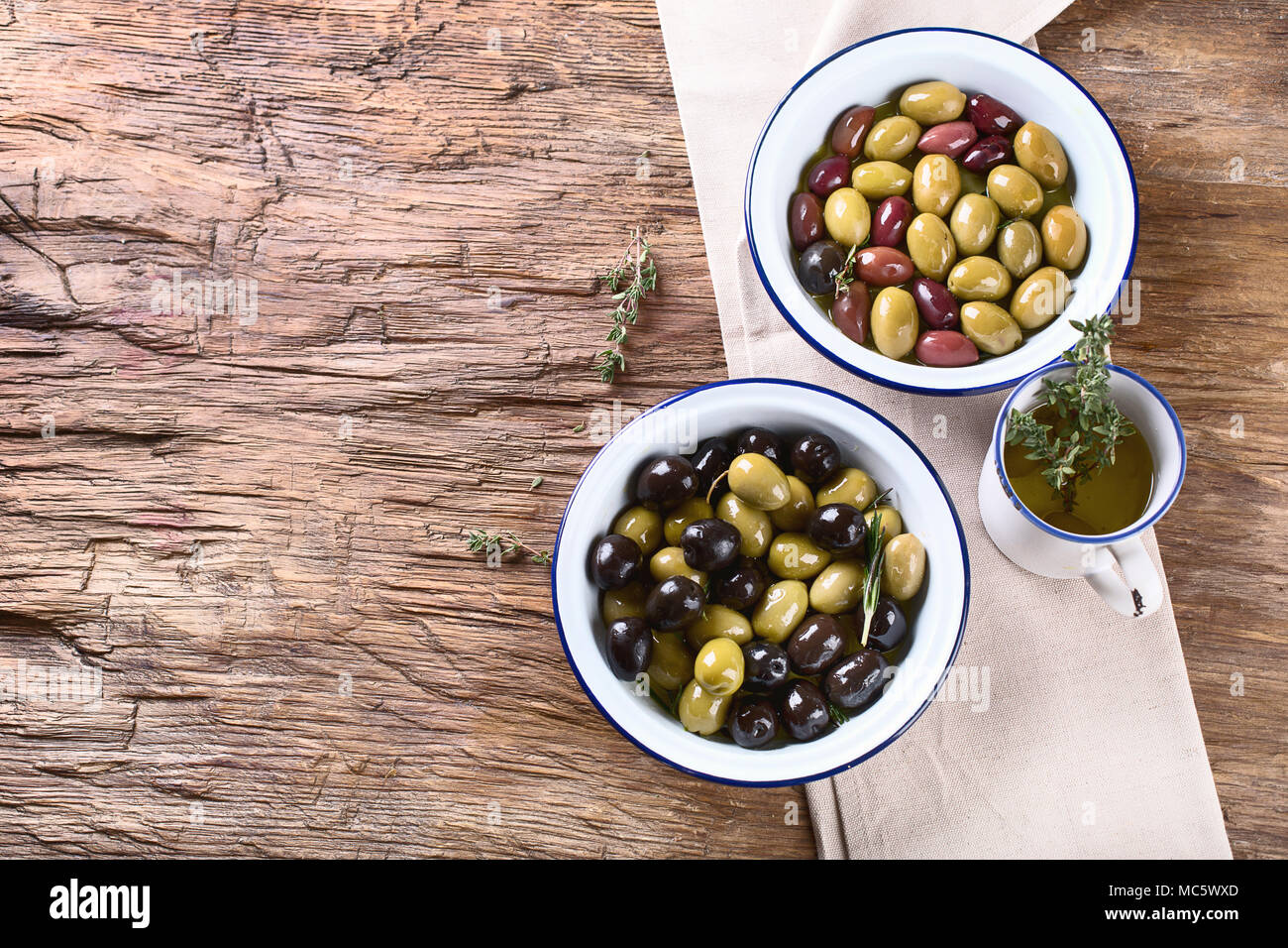 Different kind of olives. Green, black and kalamata olives Stock Photo ...