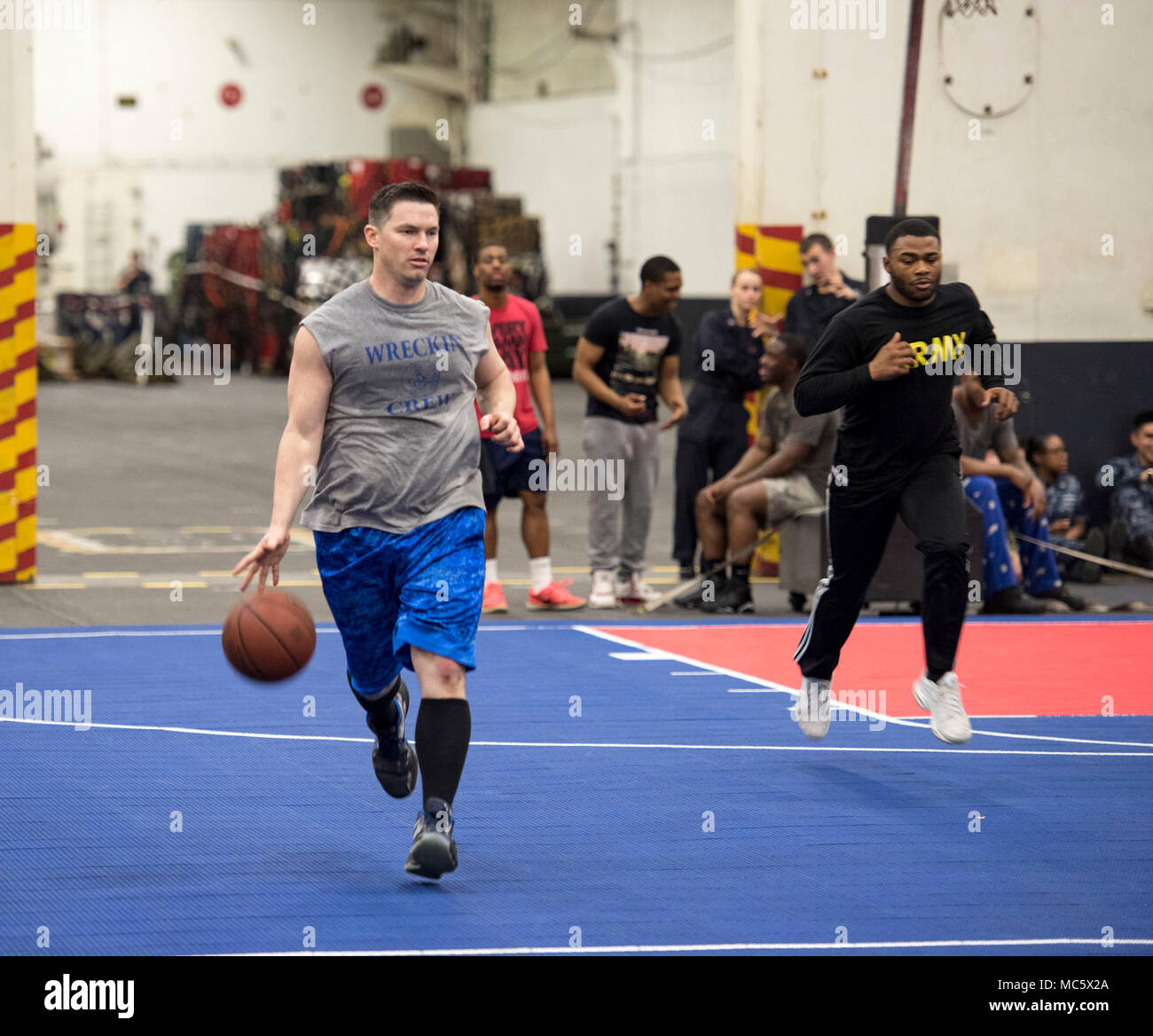ATLANTIC OCEAN (March 31, 2018) Sailors compete during a basketball ...
