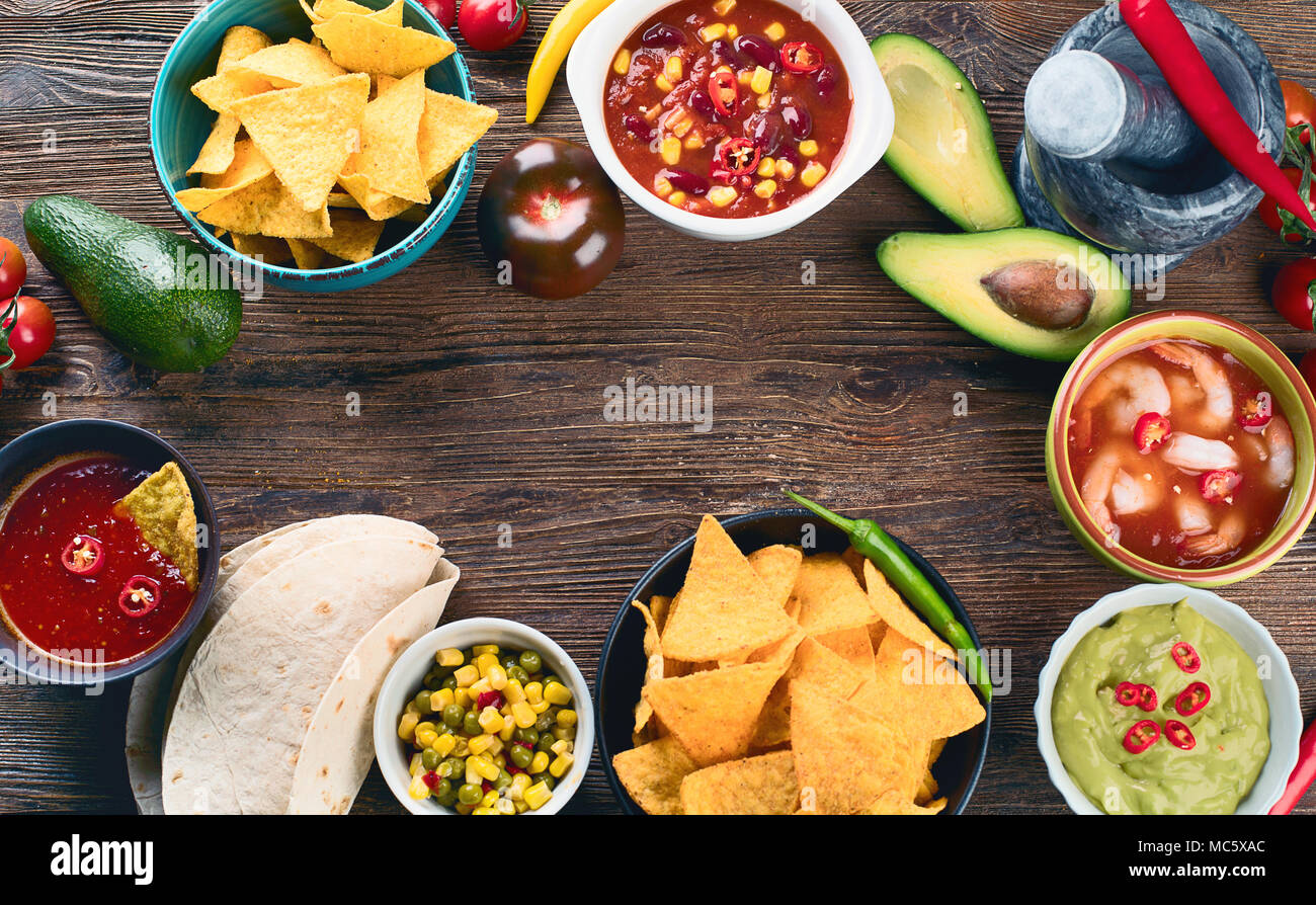 Mexican traditional food on wooden background. Top view Stock Photo - Alamy