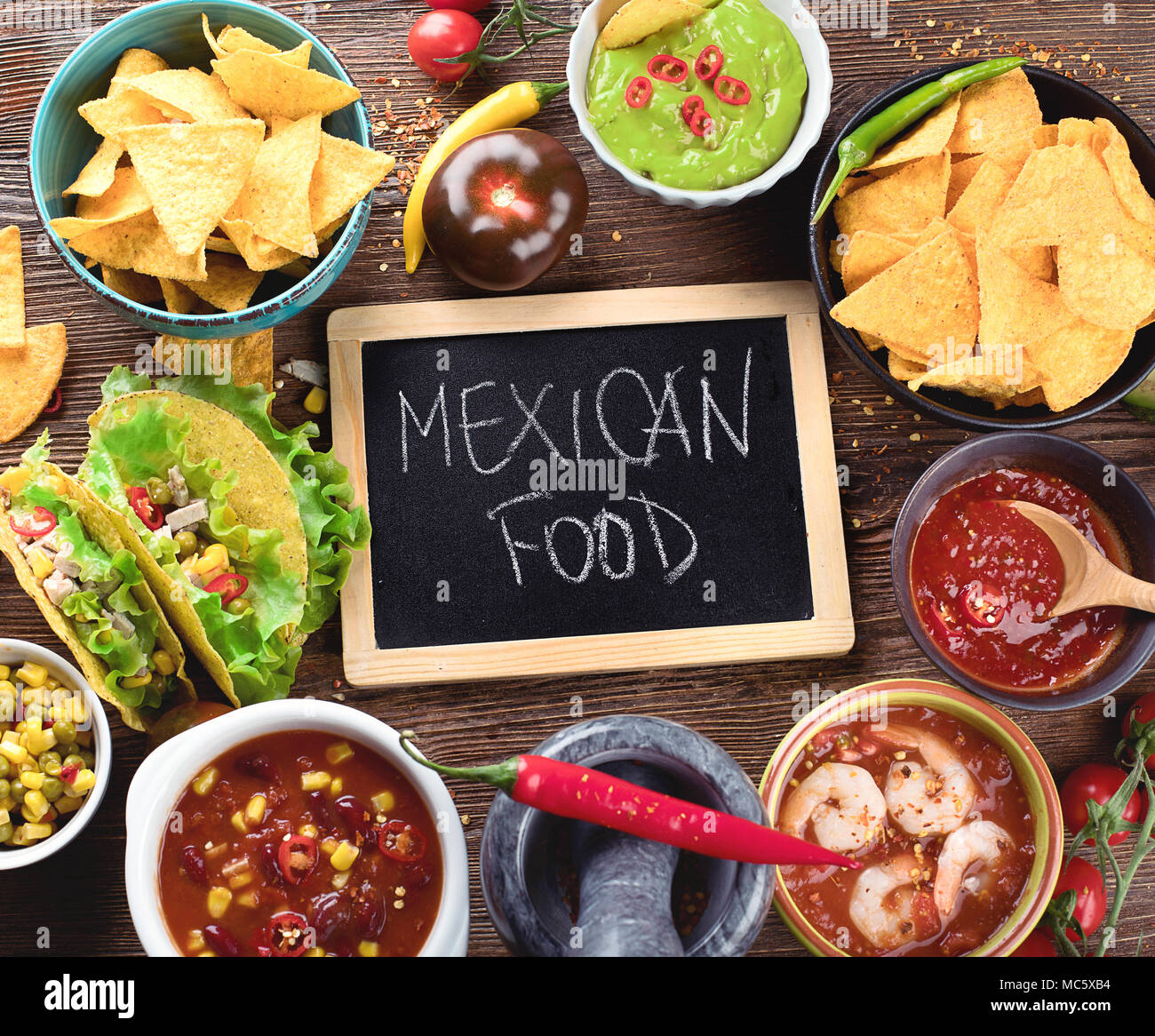 Mexican traditional food on wooden background. Top view Stock Photo - Alamy