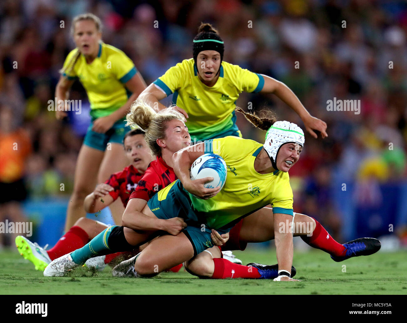 Australia's Sharni Williams is tackled by Wales' Elinor Snowsill in the ...