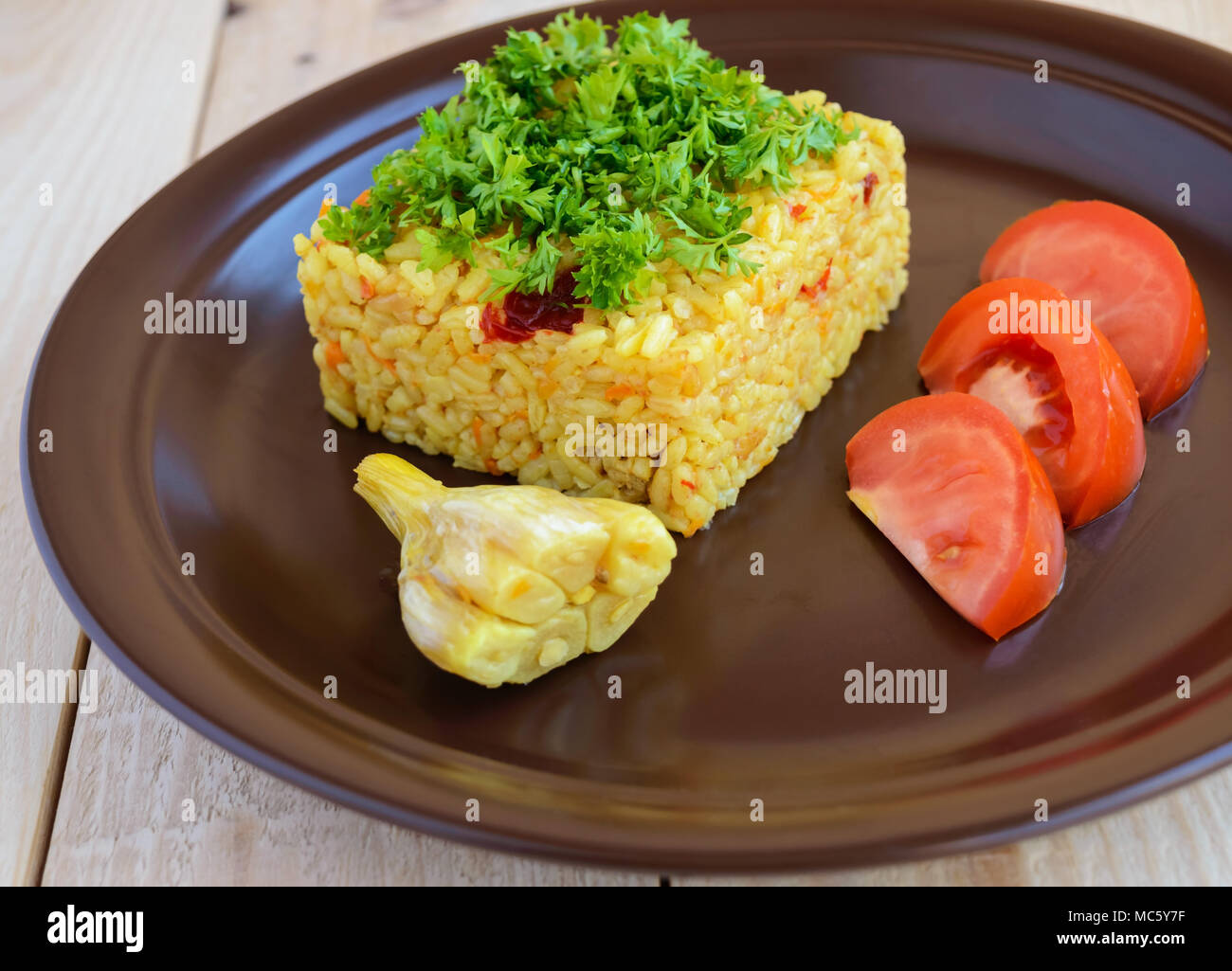 Central Asian traditional dish - pilaf (plov risotto) in the form of a ...