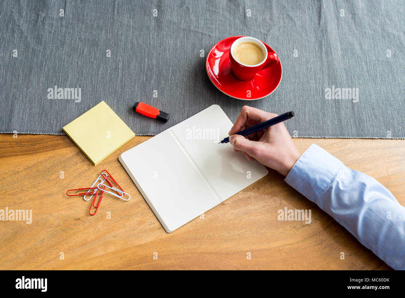 Blank white notepad with copy space for writing a message lying on ...