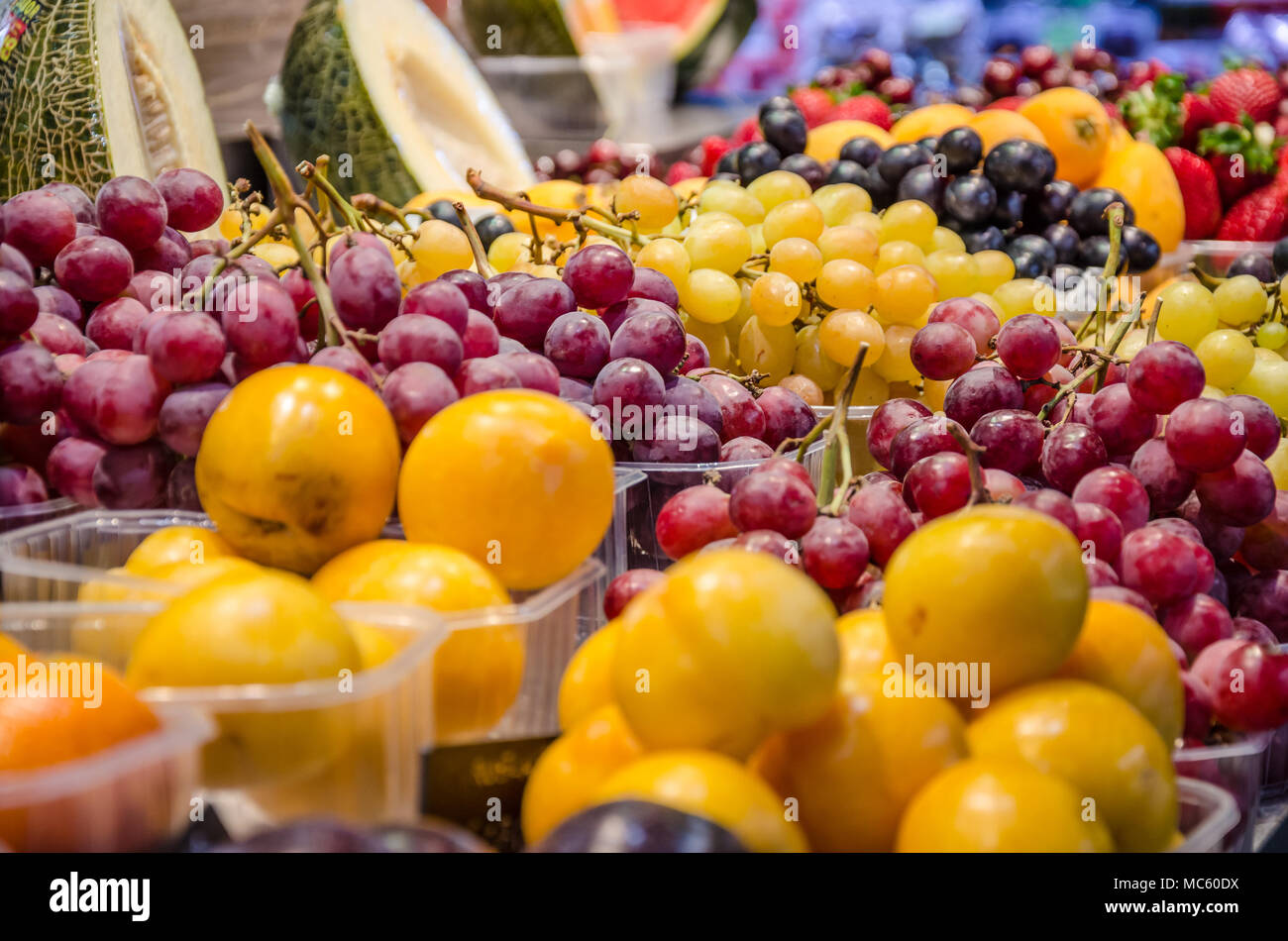 Fresh fruit on display for sale on a market stall Stock Photo - Alamy