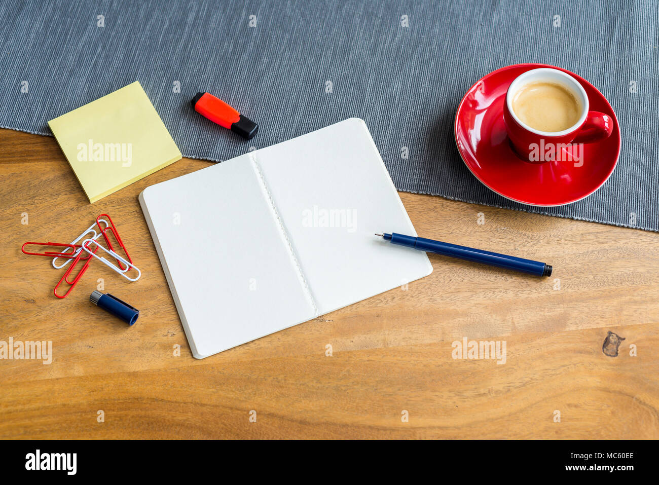 Blank white notepad with copy space for writing a message lying on ...