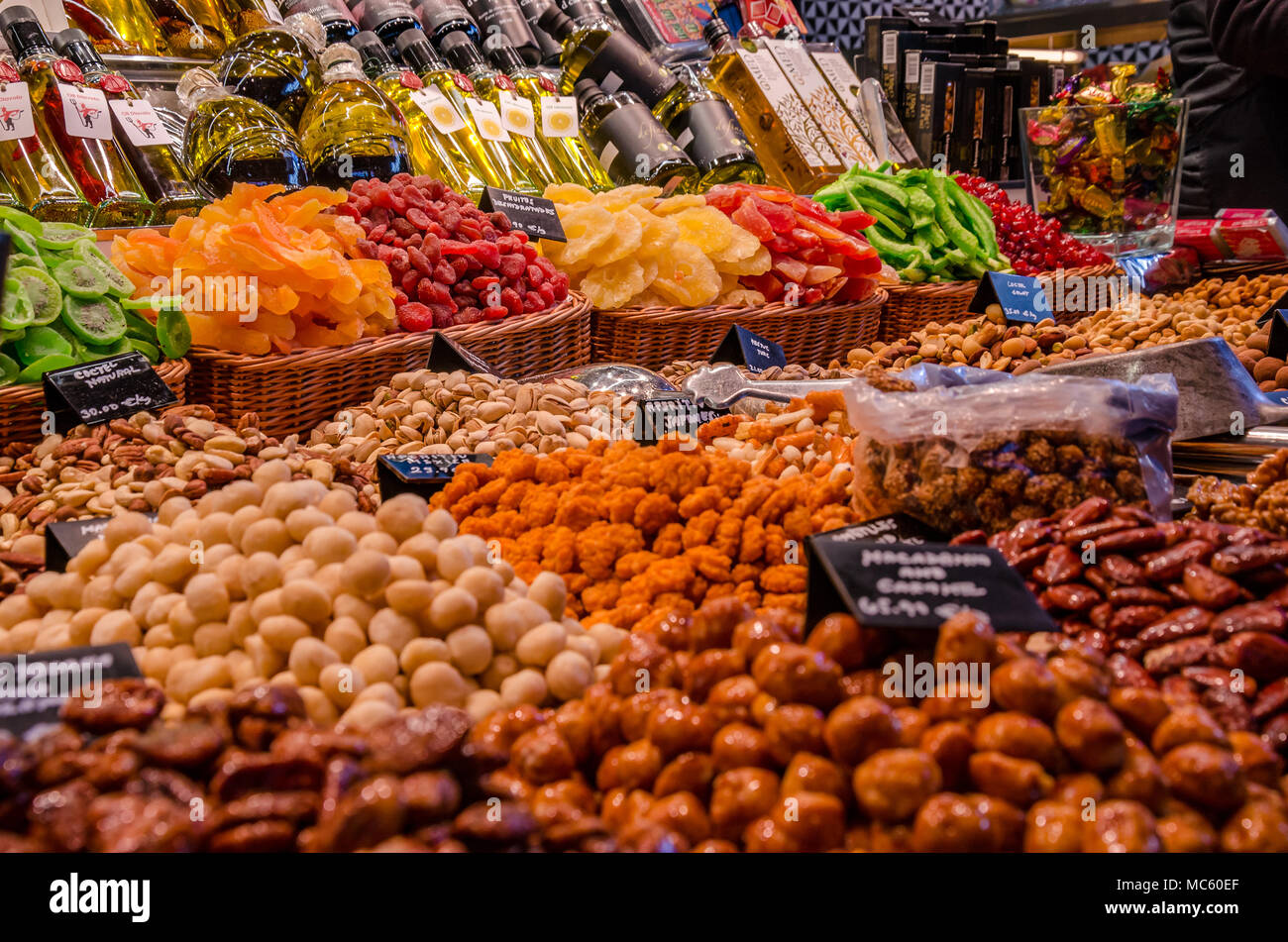 A close up view of nuts and snacks for sale on a market stall Stock ...