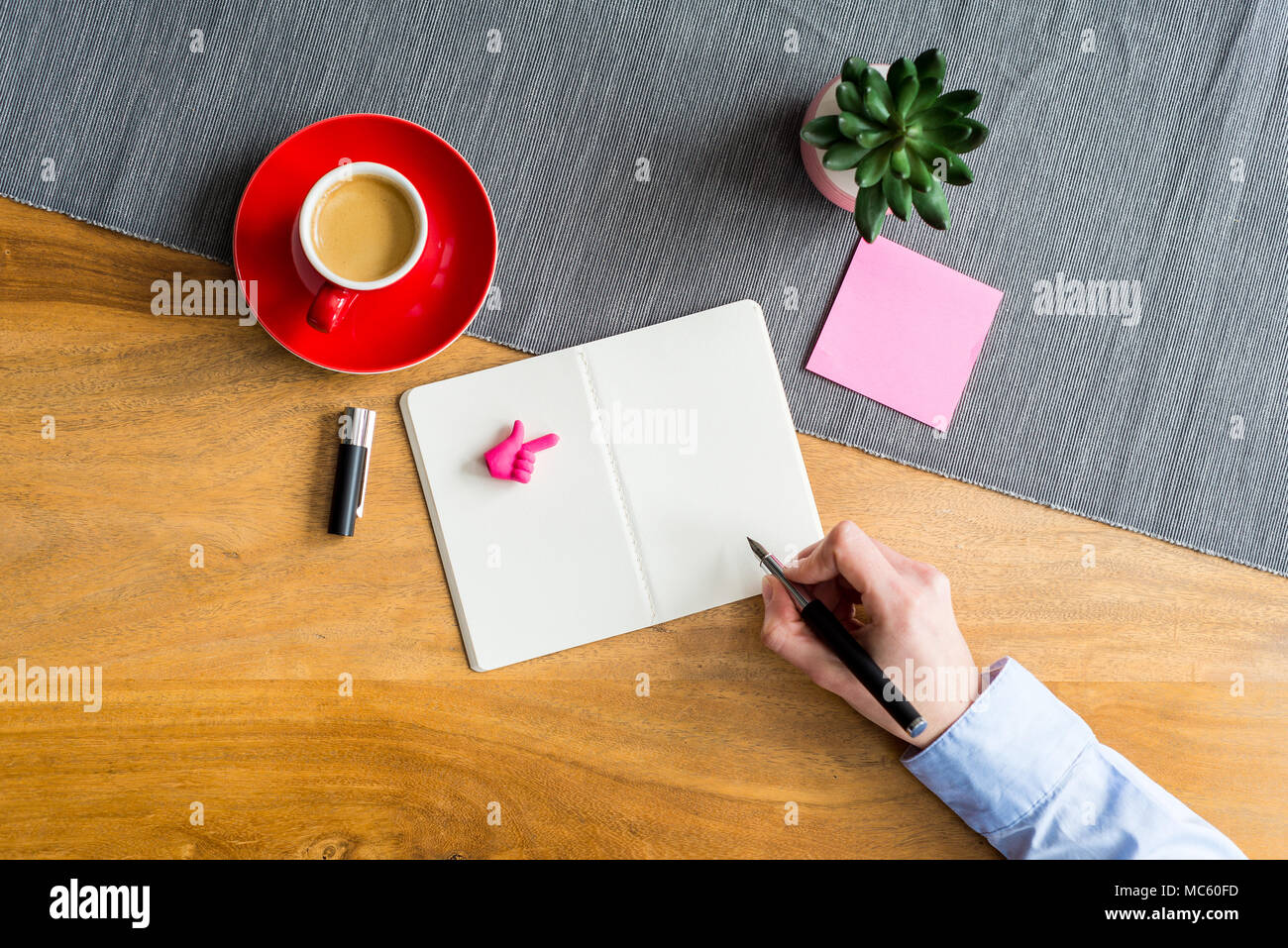 Blank white notepad with copy space for writing a message lying on ...