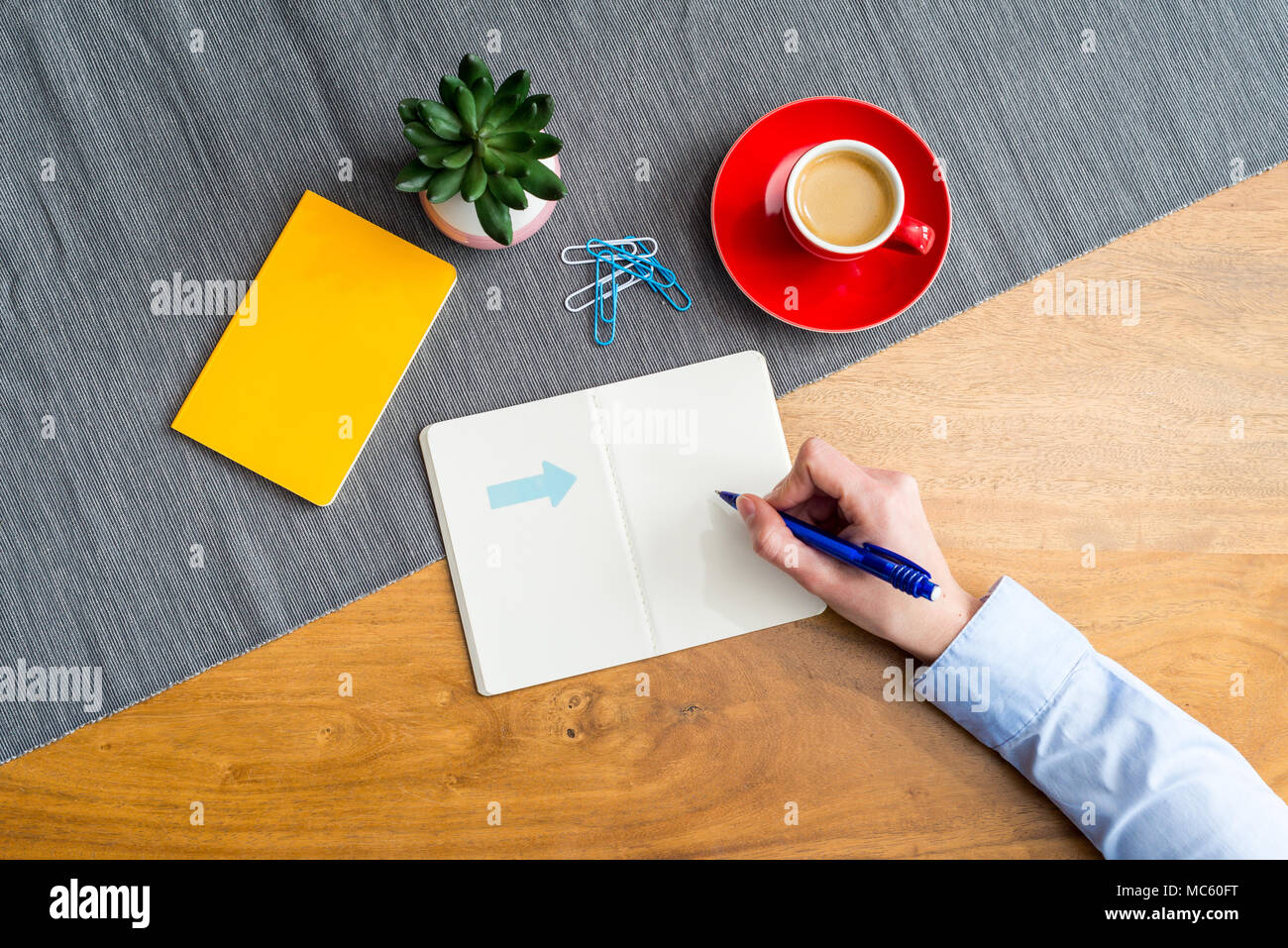 Blank white notepad with copy space for writing a message lying on ...