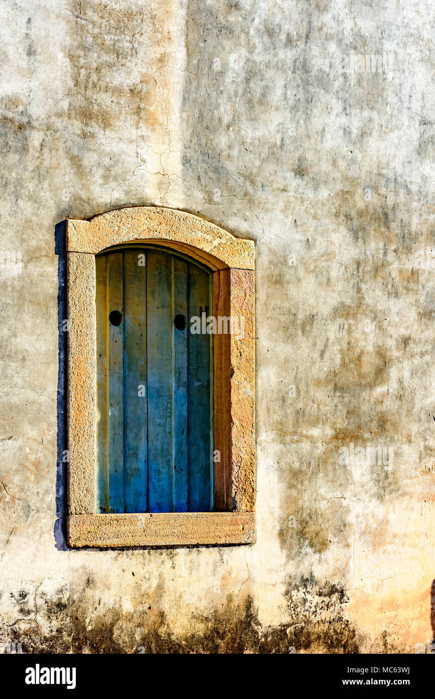 Old church window made of wood in colonial style with frame in stone in ...