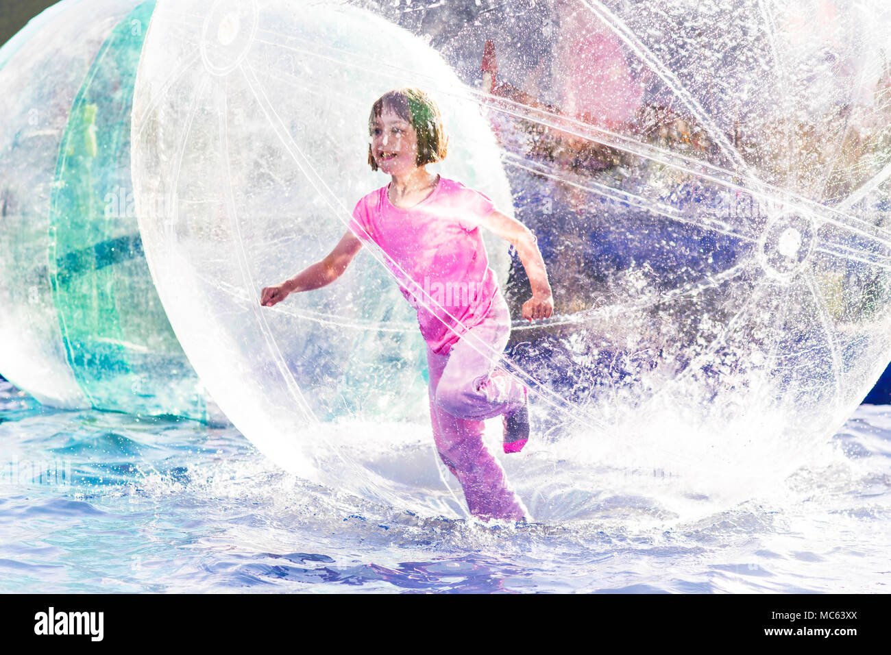 Child water float hi-res stock photography and images - Alamy