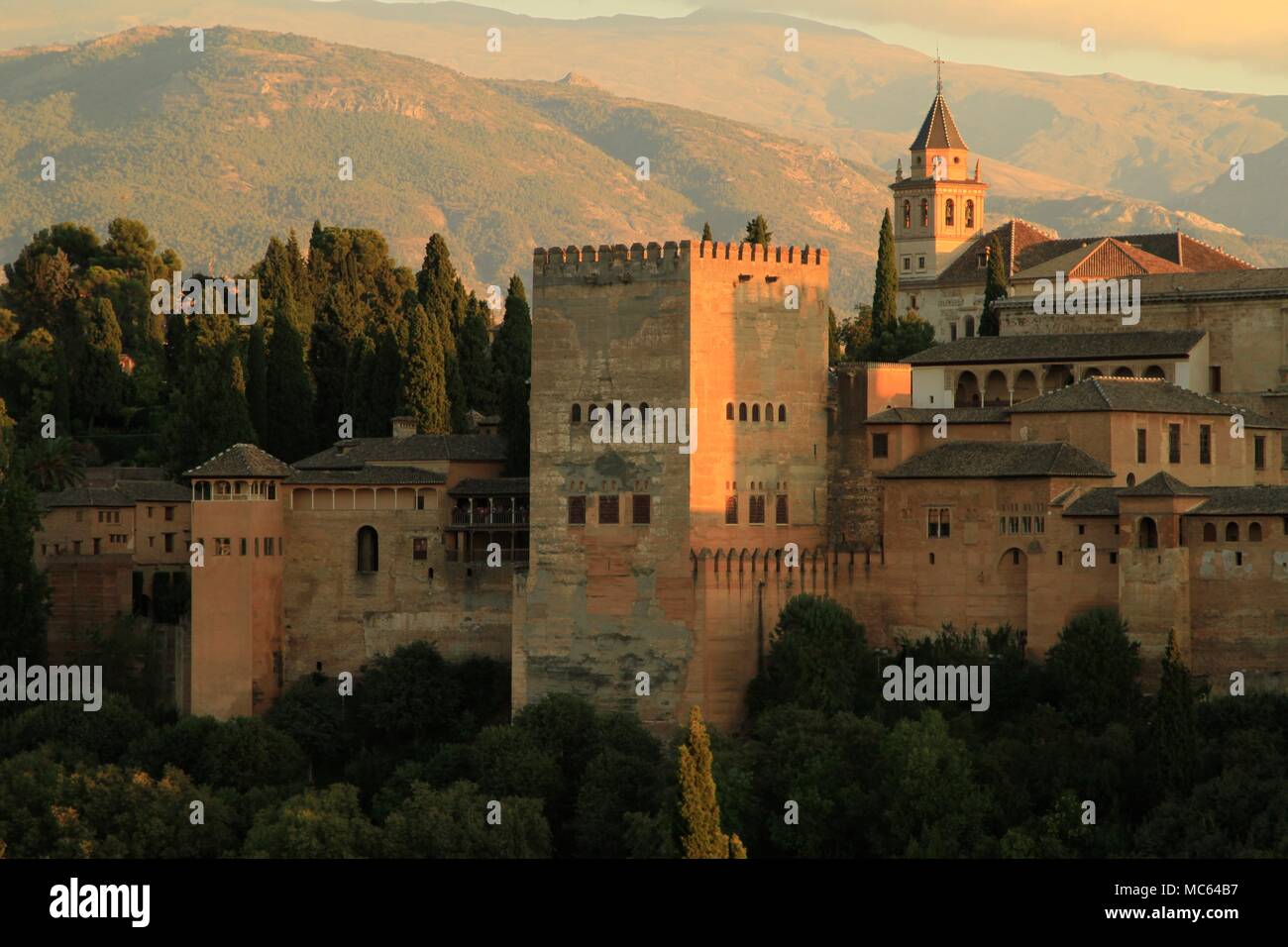The Tower of Comares at sunset, Alhambra de Granada, Spain Stock Photo ...