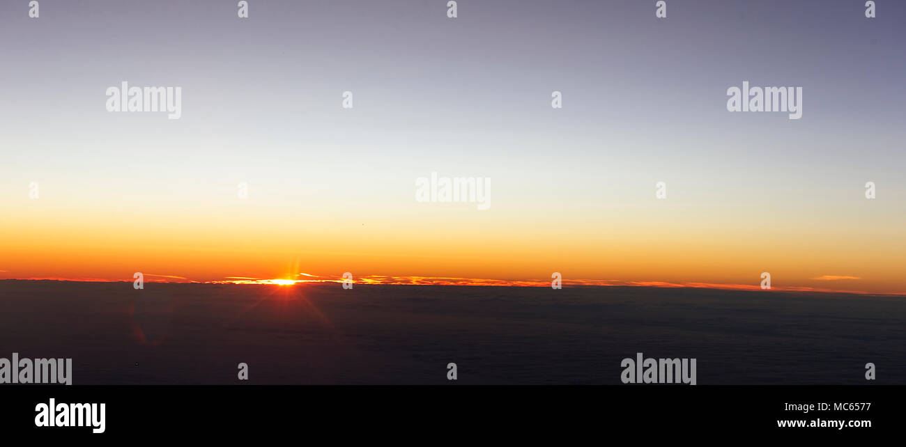 Sunset, in flight panorama Stock Photo - Alamy