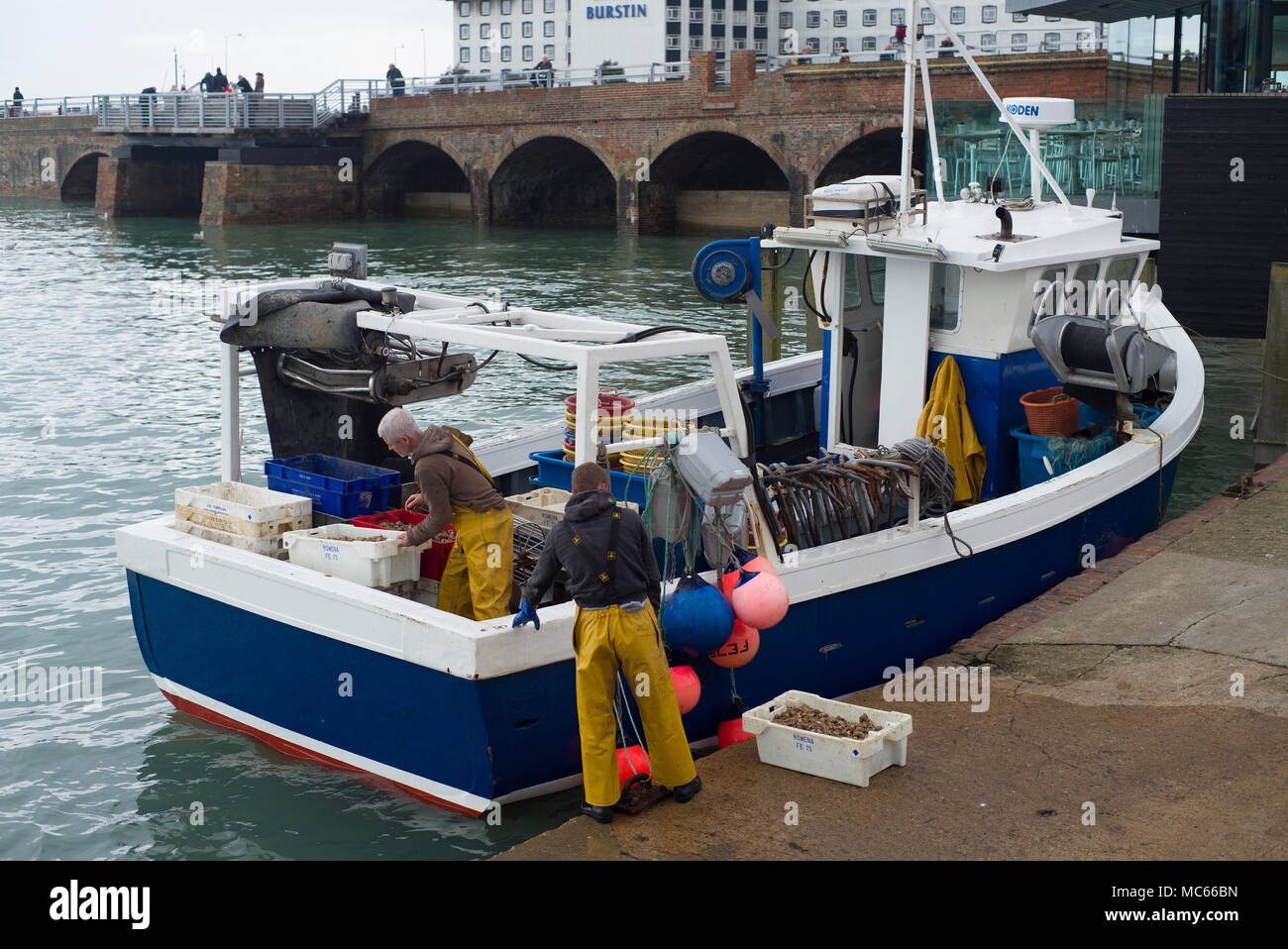 Fishing vessel boat load fish hi-res stock photography and images - Alamy
