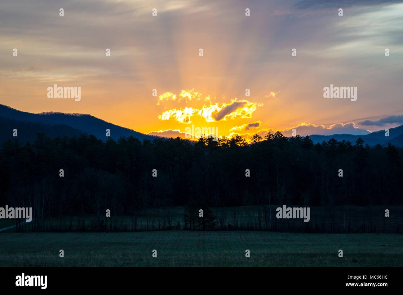 Sunlight sunrise over mountains hi-res stock photography and images - Alamy
