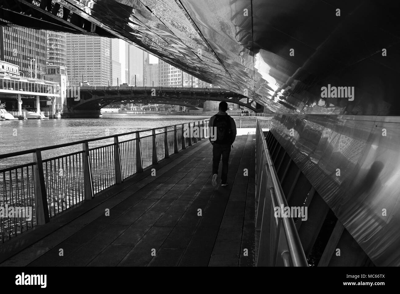 Beneath the Dearborn Street bridge along Chicago's Riverwalk Stock ...