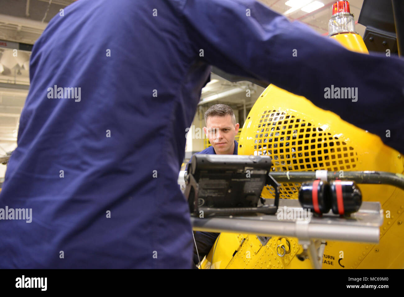 Petty Officer 1st Class Joshua Shaffer, an aviation maintenance ...