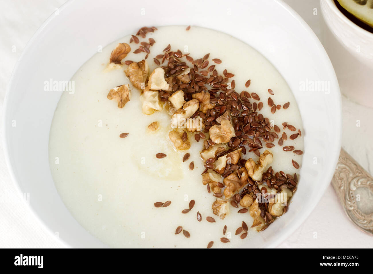 Traditional semolina porridge with butter, nuts and flax seed. A useful ...
