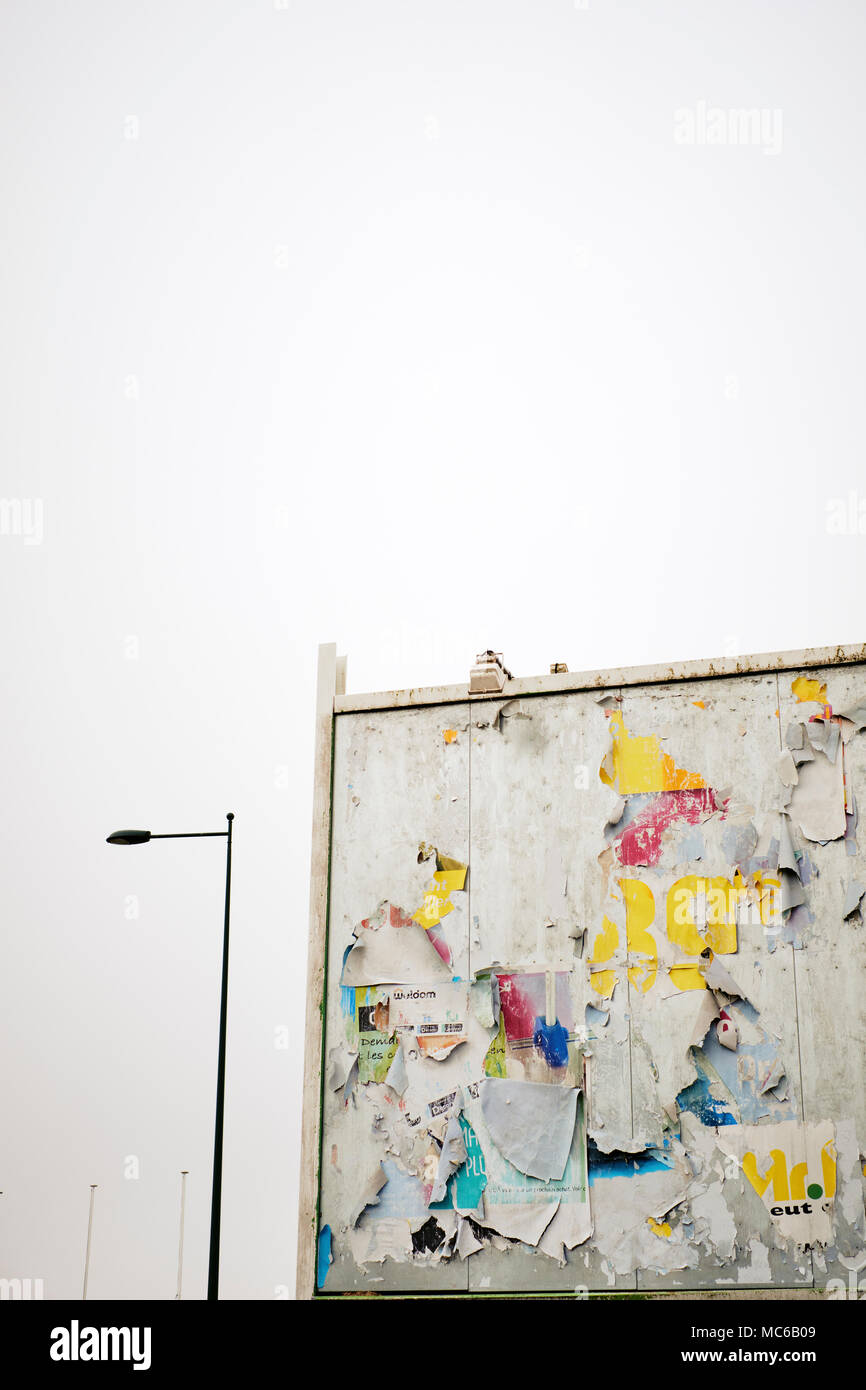 Old poster billboard torn hi-res stock photography and images - Alamy