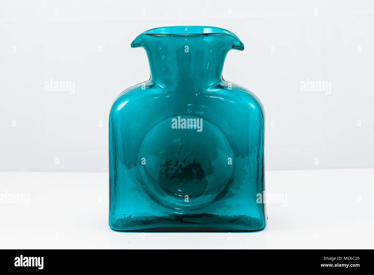 blue glass water jar Stock Photo - Alamy