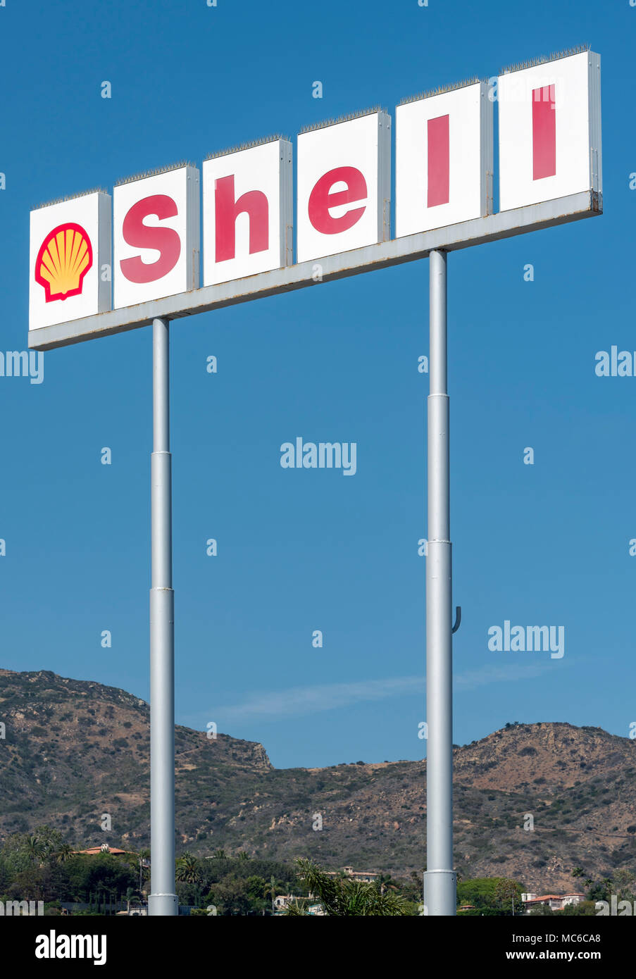 Shell logo and sign on poles, Los Angeles Stock Photo - Alamy