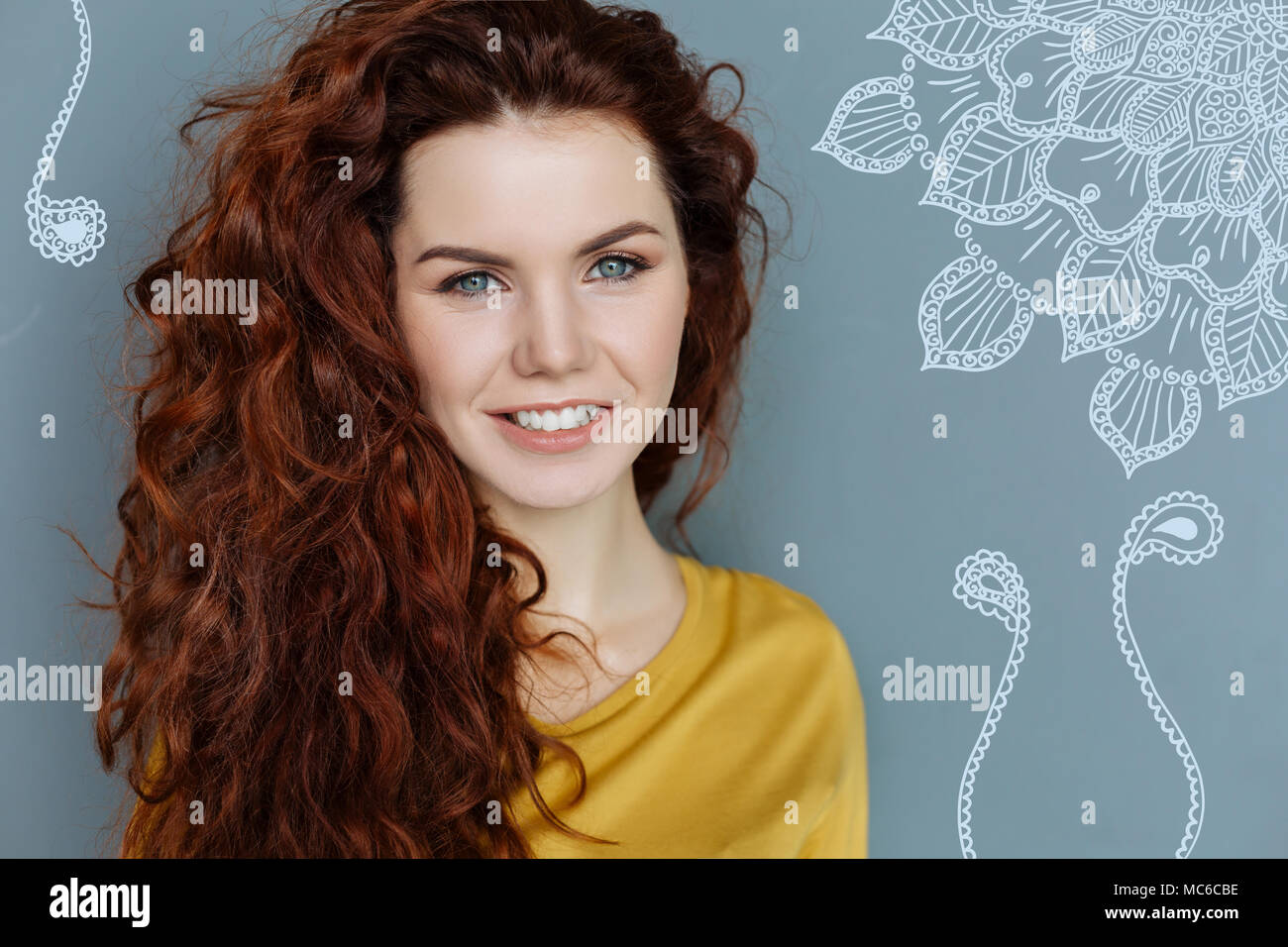 Beautiful young actress smiling when posing for a photo Stock Photo - Alamy