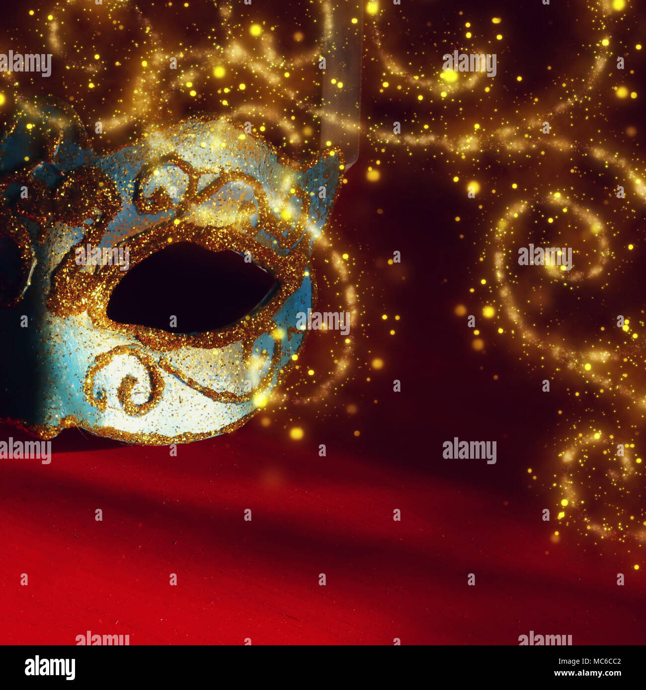 Image of elegant blue and gold venetian mask over red background Stock ...