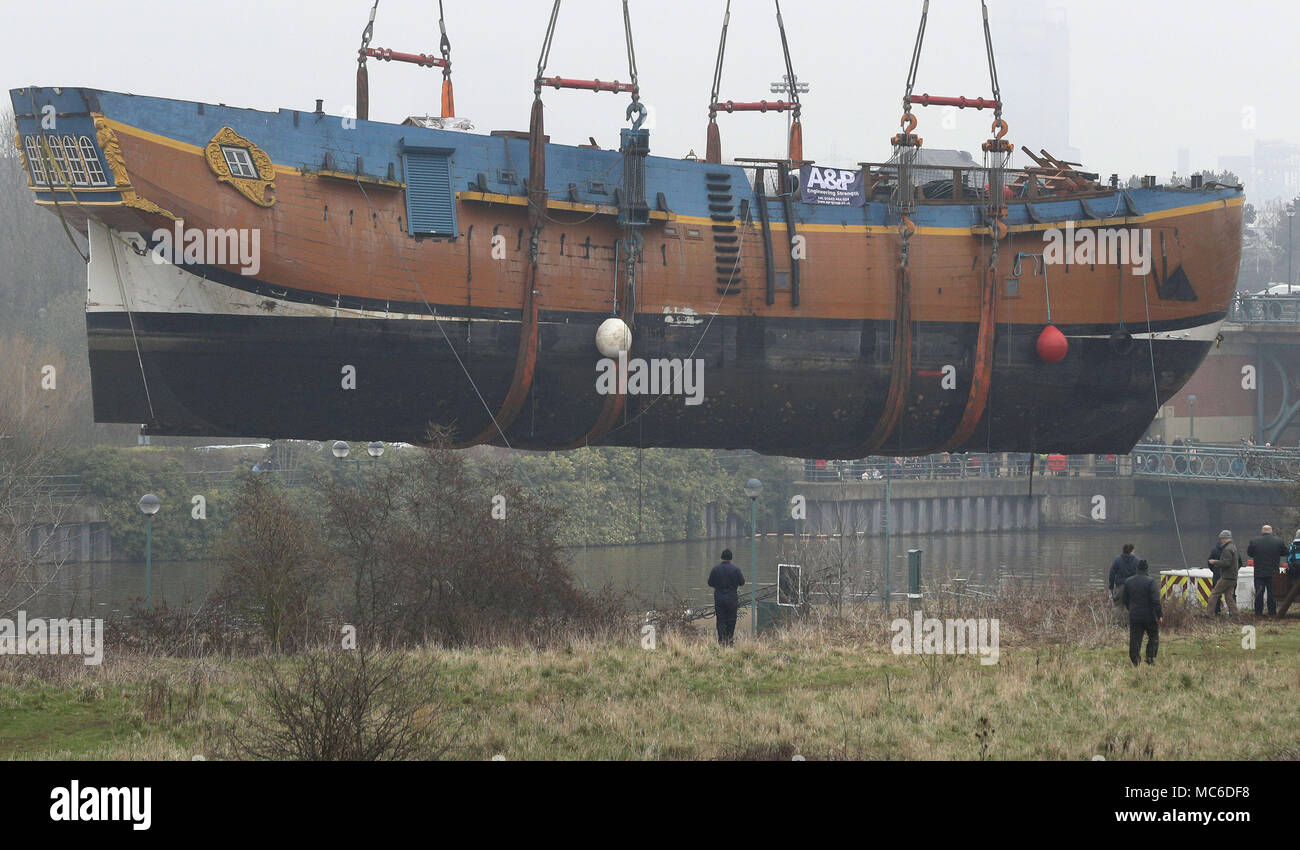 A full scale replica of HM Bark Endeavour being lifted past the Tees ...