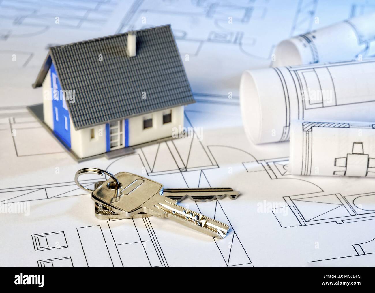 House and two keys on construction plans | usage worldwide Stock Photo ...